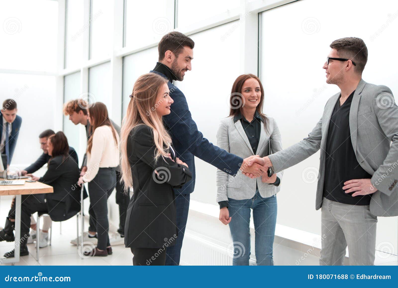 Business Colleagues Greeting Each Other with a Handshake Stock Photo ...
