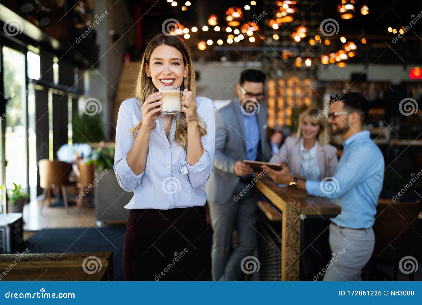 Business Colleagues Having Conversation during Coffee Break Stock Photo ...