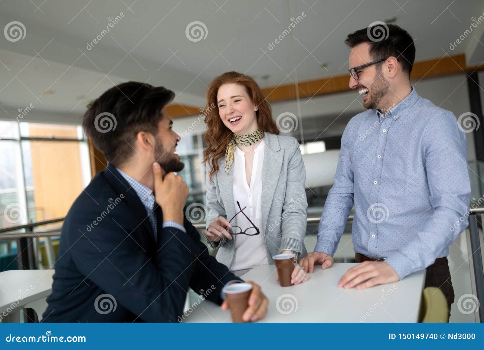 Business Colleagues Having Conversation during Coffee Break Stock Photo ...