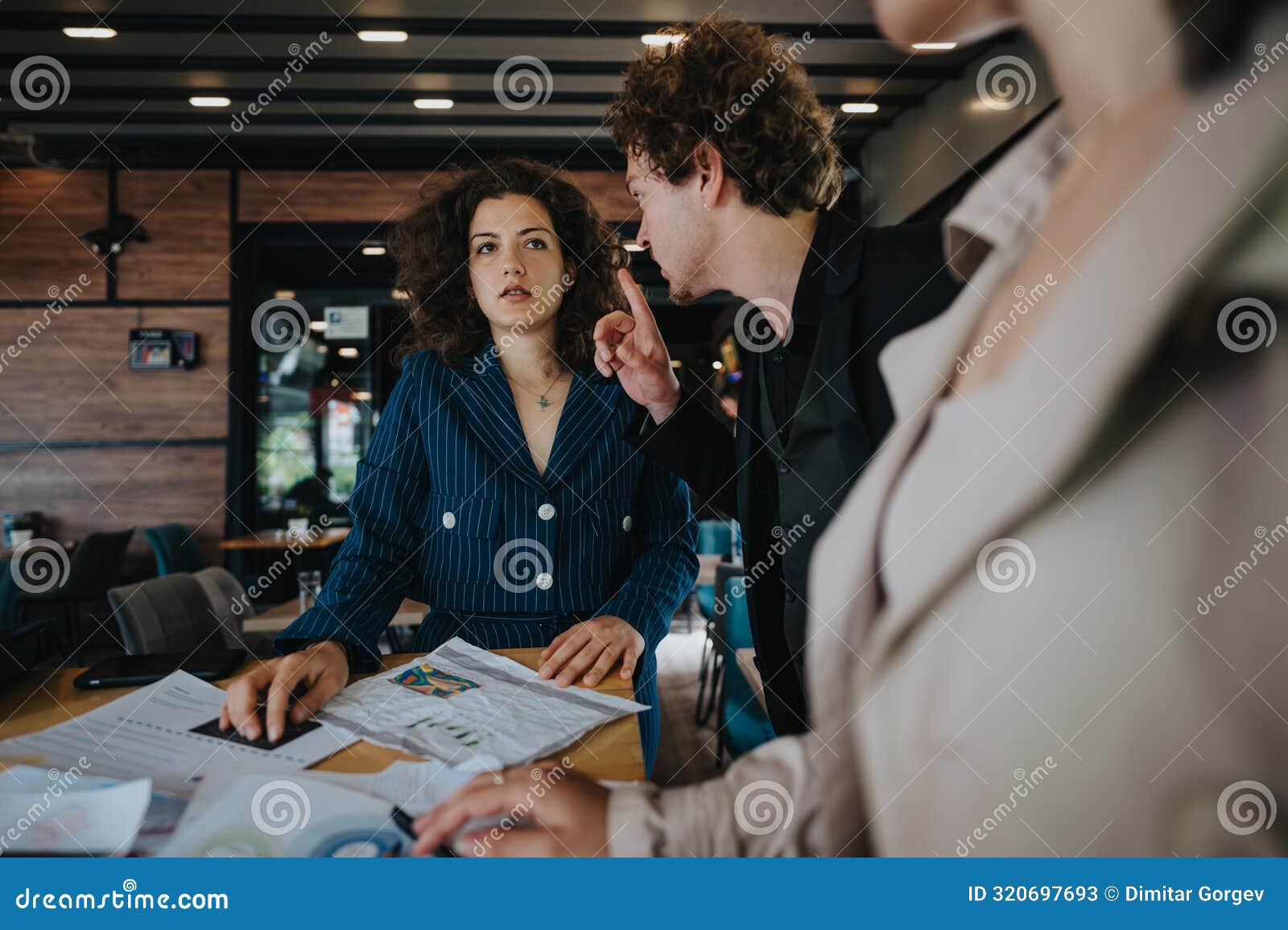 Business Colleagues Having a Misunderstanding and Arguing in a Modern ...