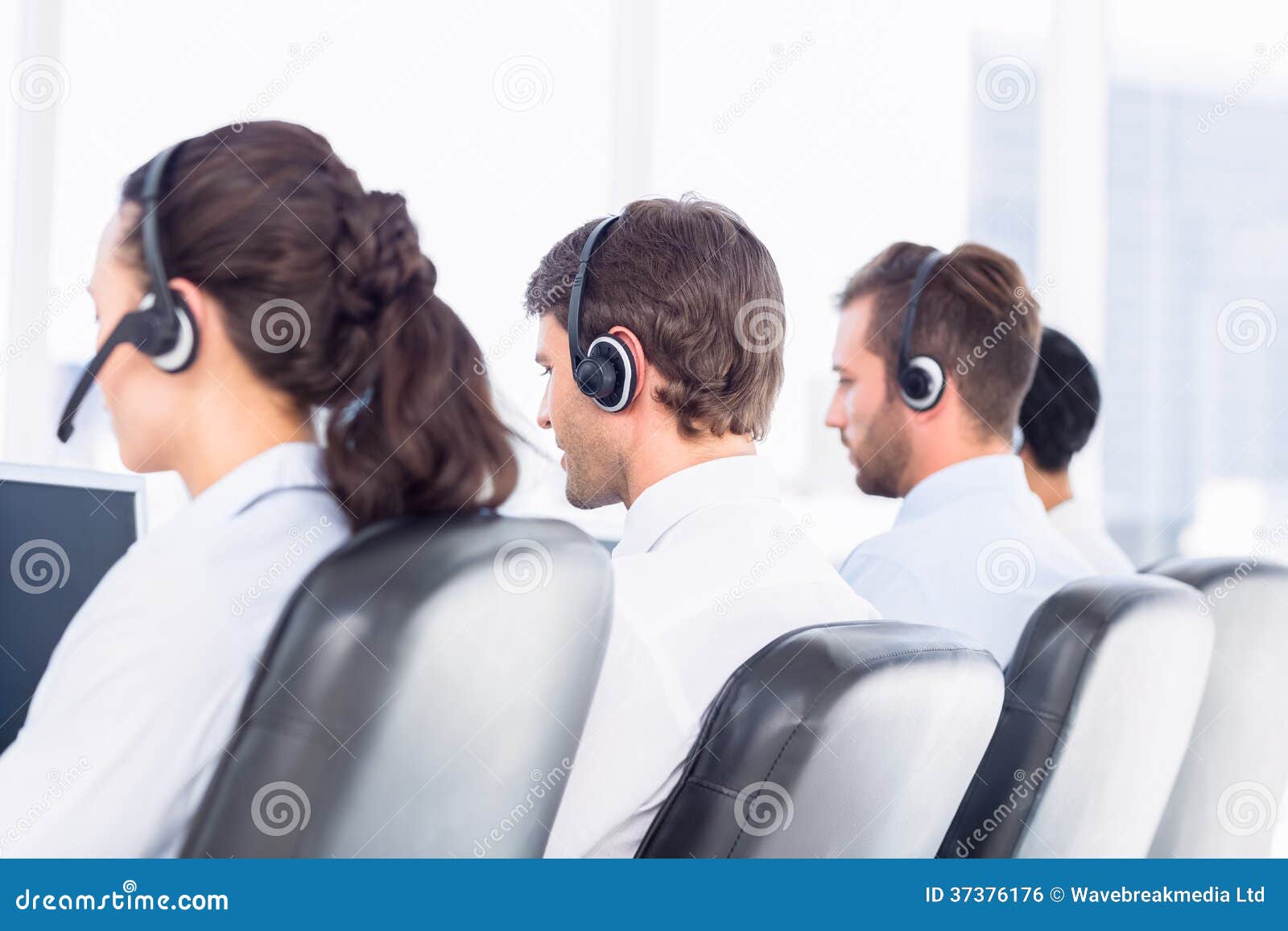 Business Colleagues with Headsets in a Row Stock Photo - Image of view ...