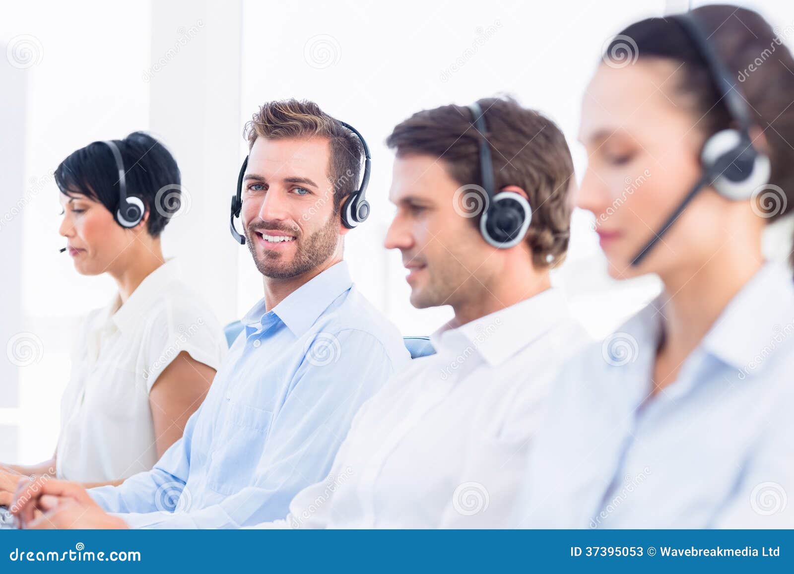 Business Colleagues with Headsets in a Row Stock Image - Image of ...