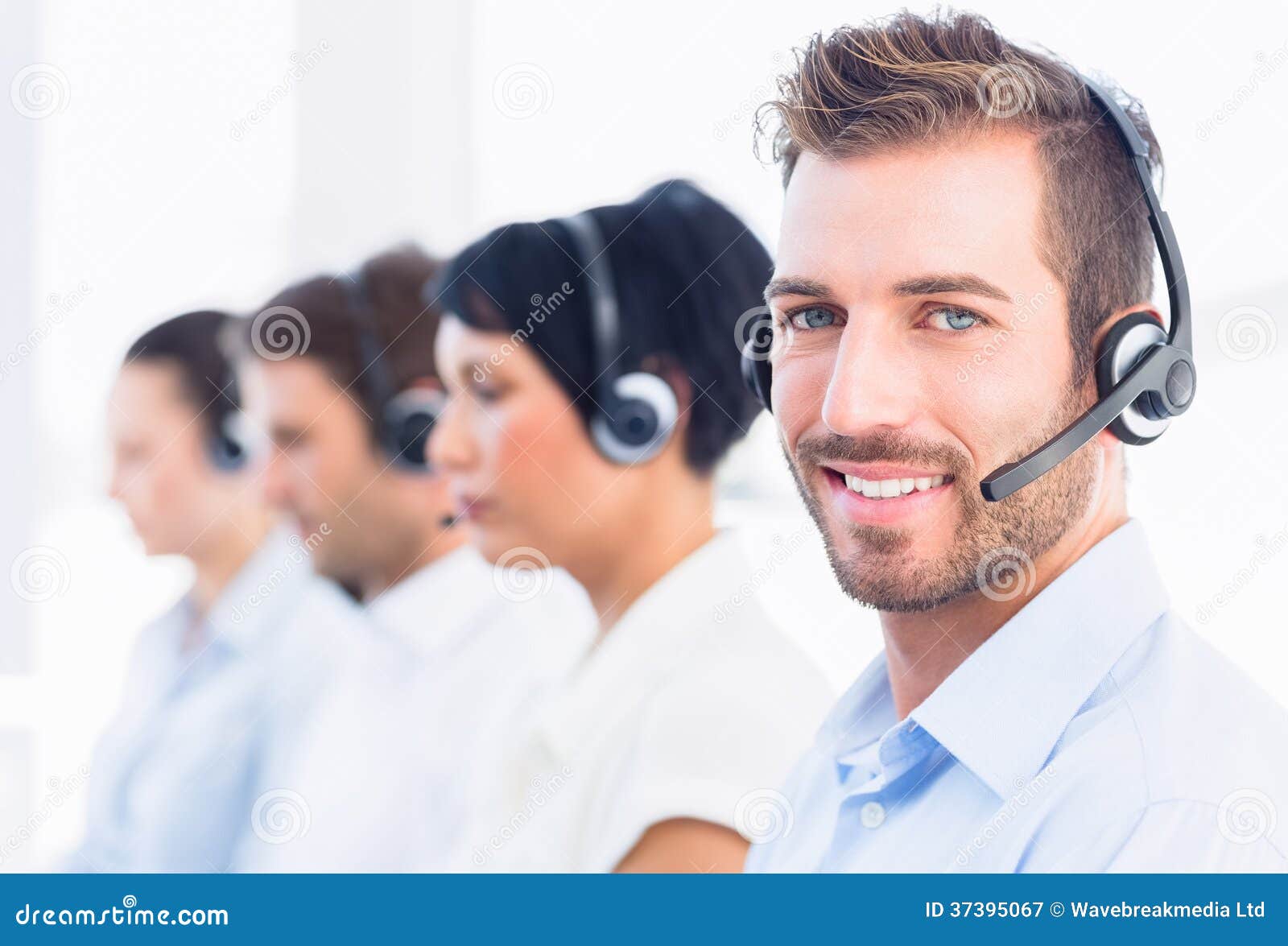 Business Colleagues with Headsets in a Row Stock Image - Image of ...