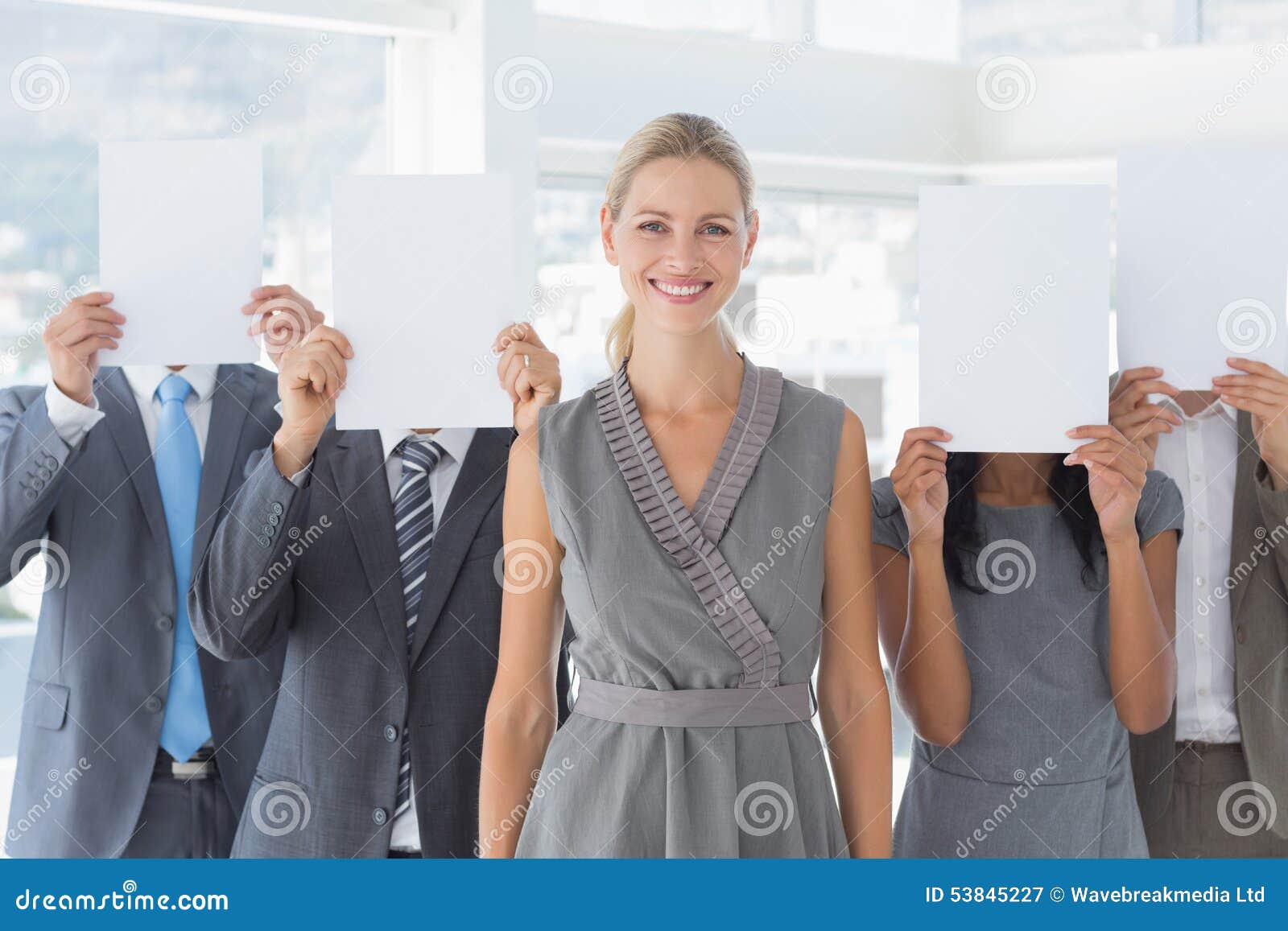 Business Colleagues Hiding Their Face with Paper Stock Image - Image of ...