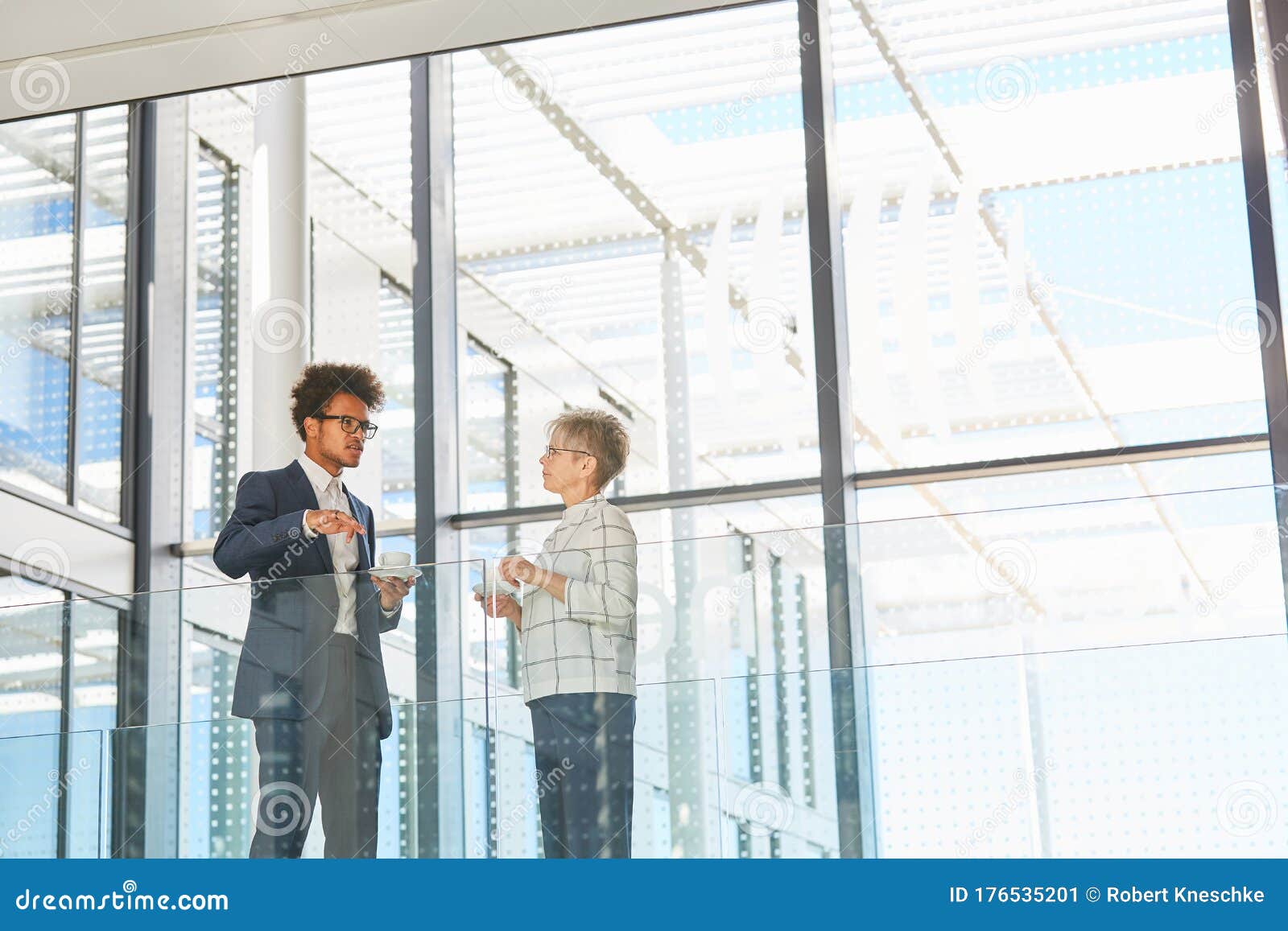 Business Colleagues Make Small Talk during the Coffee Break Stock Image ...