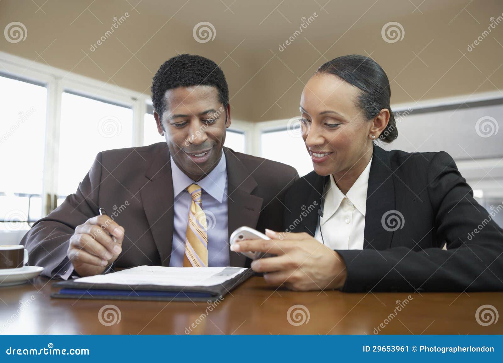 Business Colleagues Reading Document Stock Image - Image of indoors ...