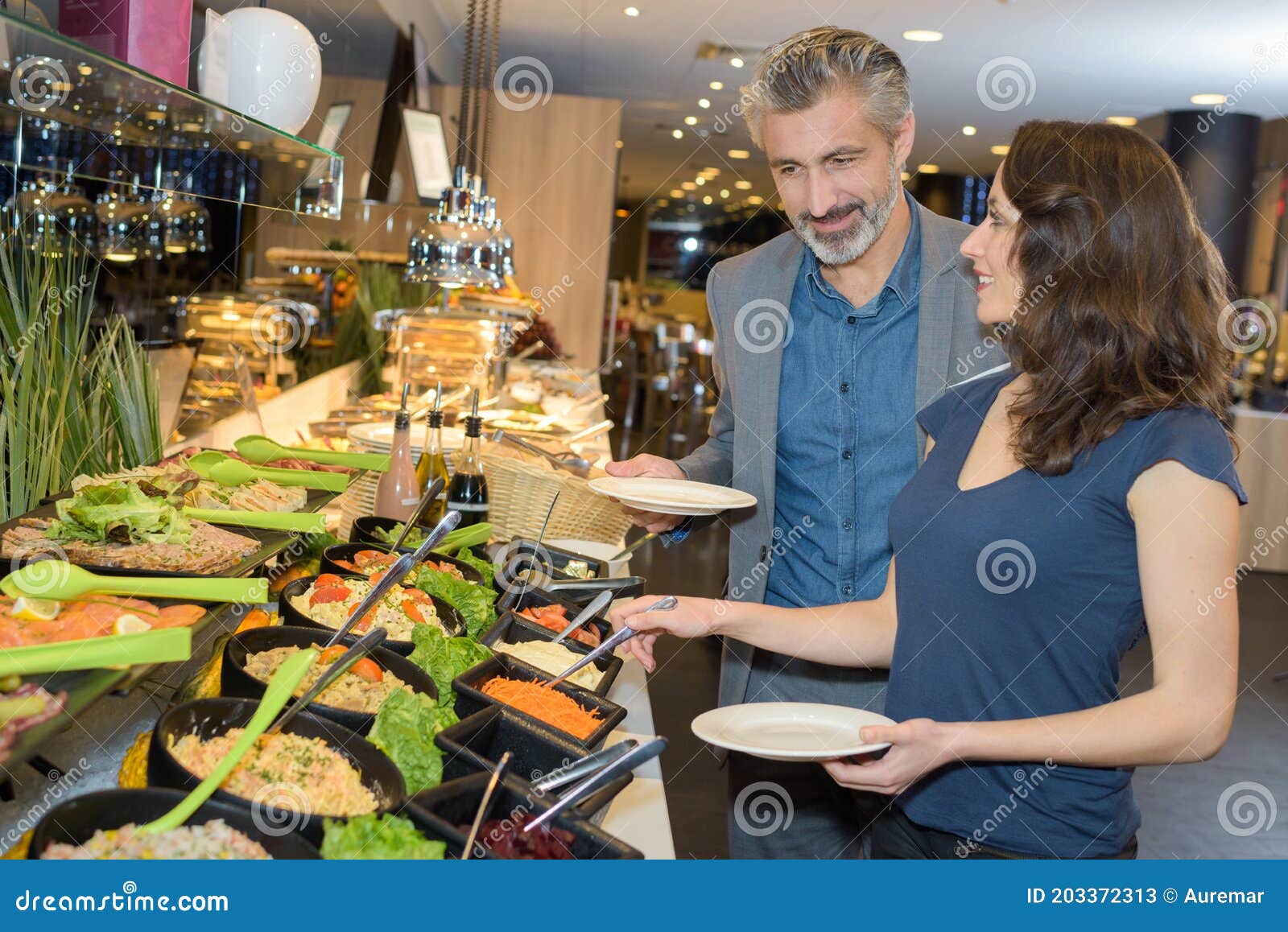 Business Colleagues Serving Themselves in Buffet Stock Image - Image of ...