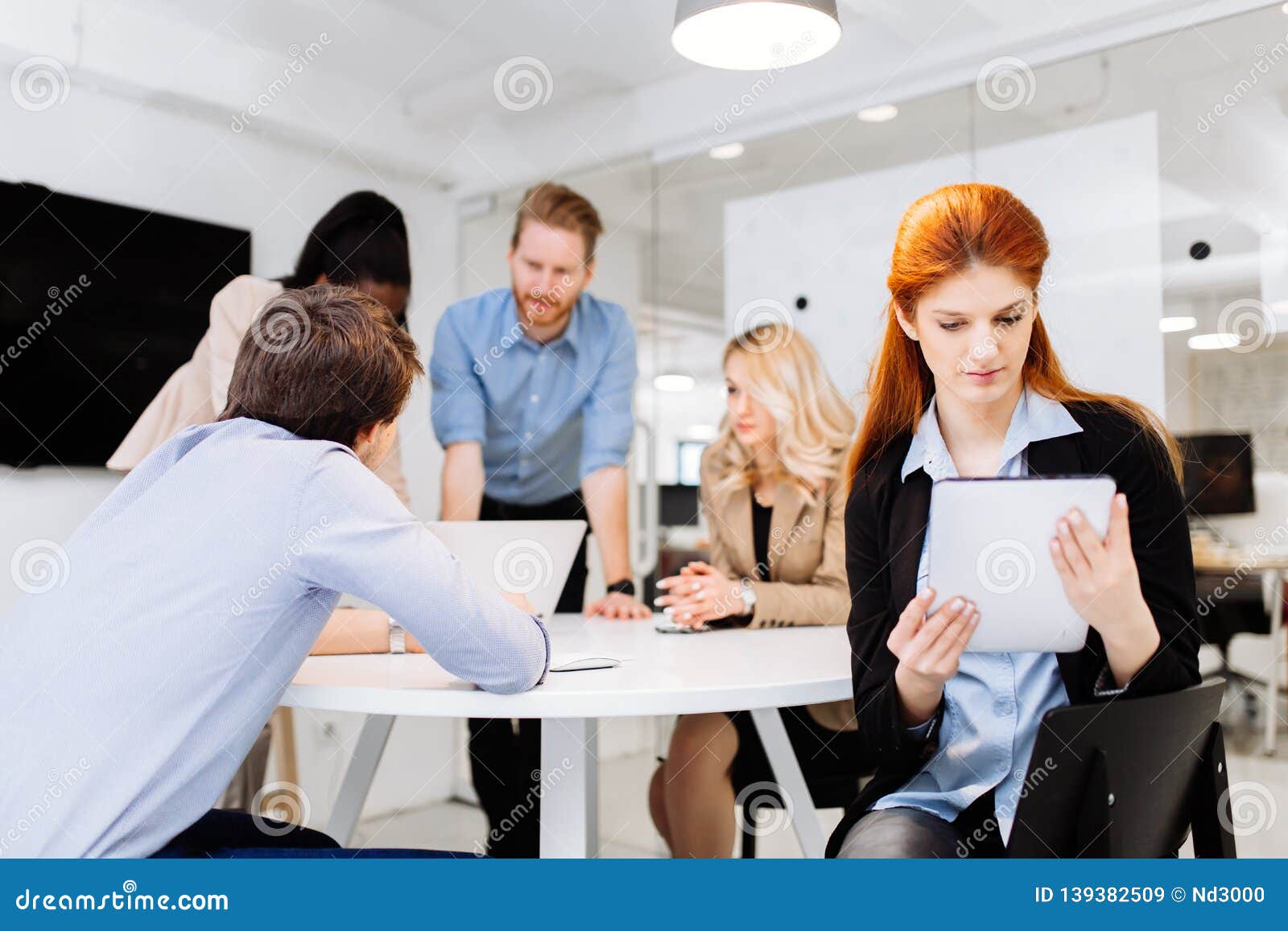 Business Colleagues Sitting at Desk Stock Image - Image of work ...