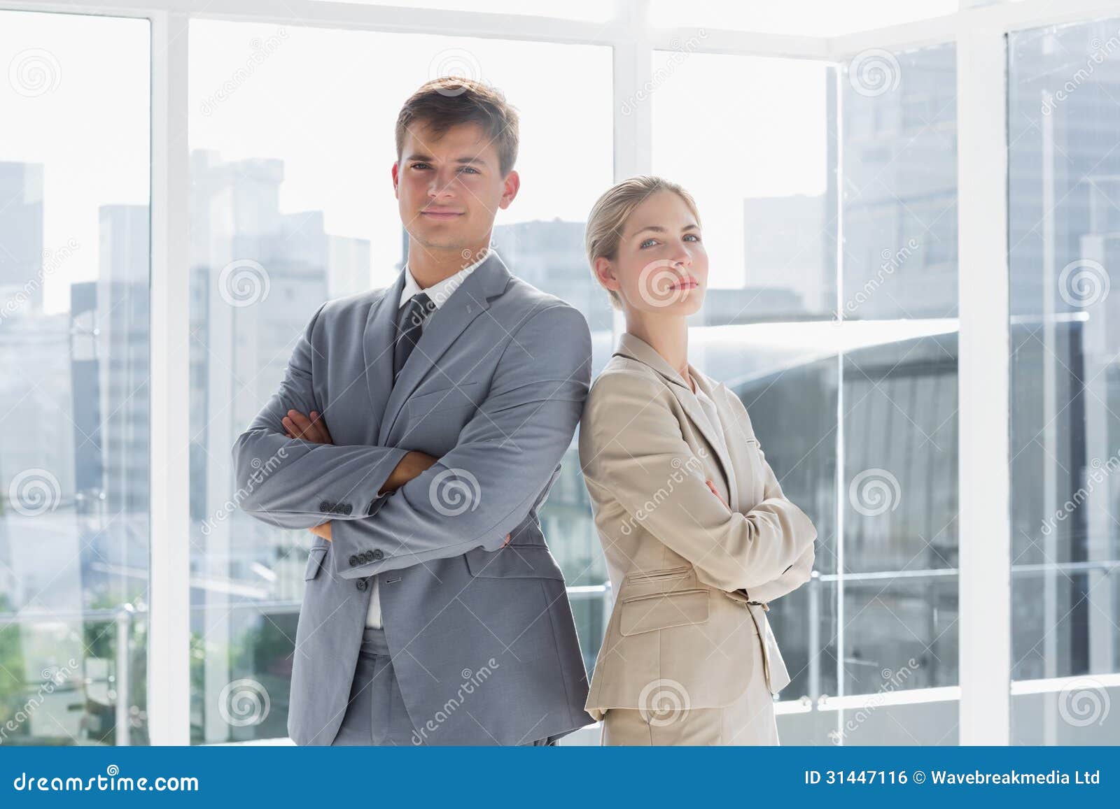 Business Colleagues Standing in Their Office Stock Photo - Image of ...