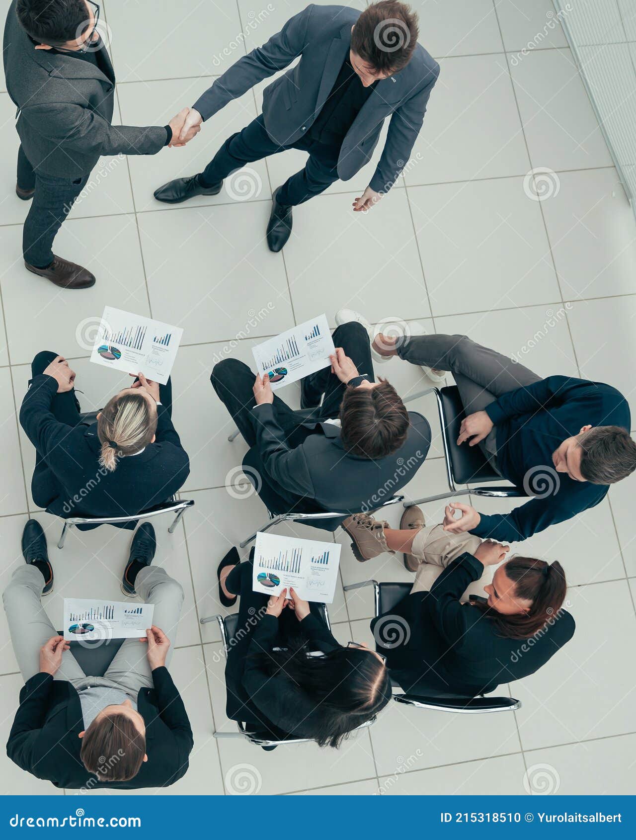 Business Colleagues Supporting Each Other with a Handshake. Stock Photo ...