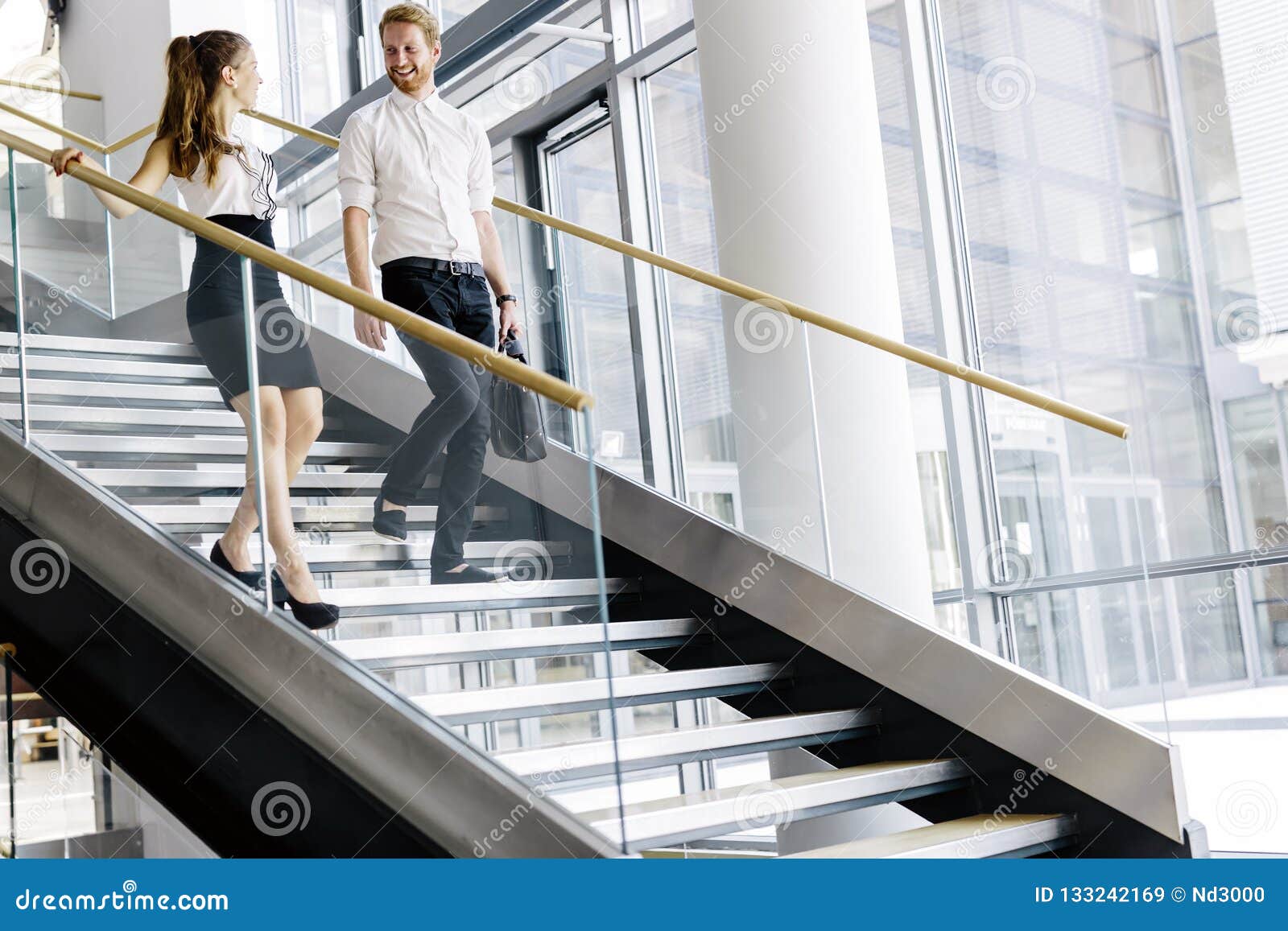 Business Colleagues Talking on Stairs Stock Image - Image of teamwork ...