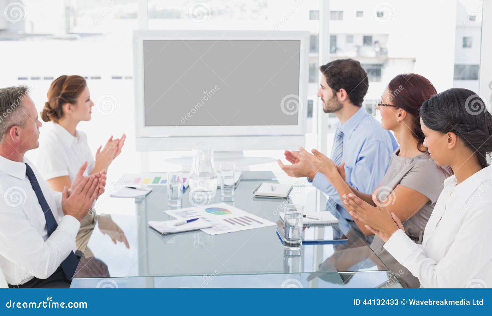 Business Colleagues Watching Video Presentation Stock Image - Image of ...