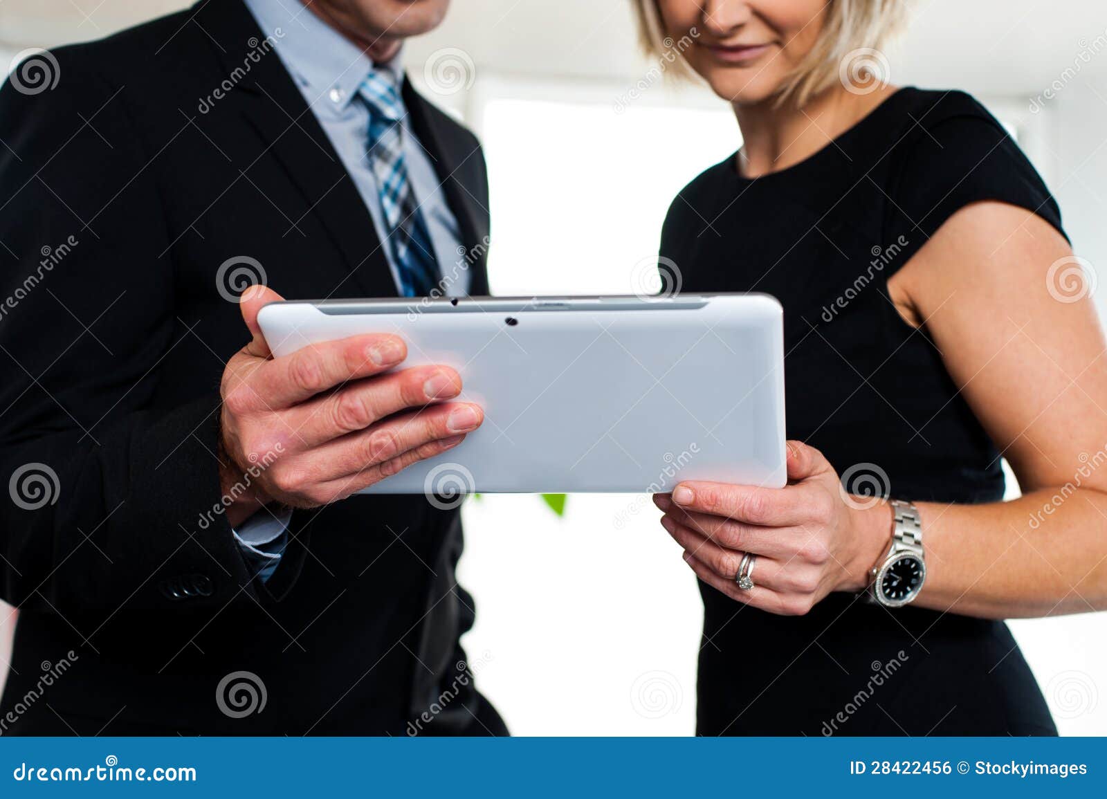 Business Colleagues Watching Videos on Tablet Stock Photo - Image of ...