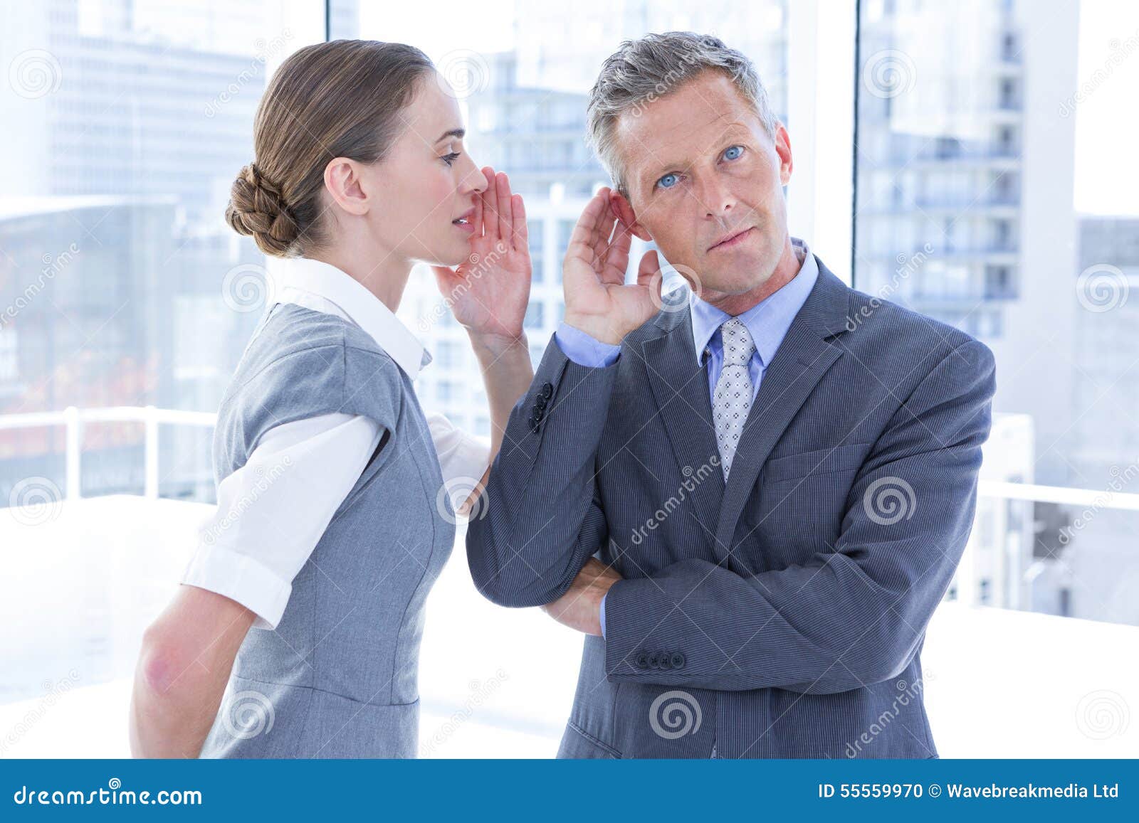 Business Colleagues Whispering Stock Photo - Image of male, news: 55559970