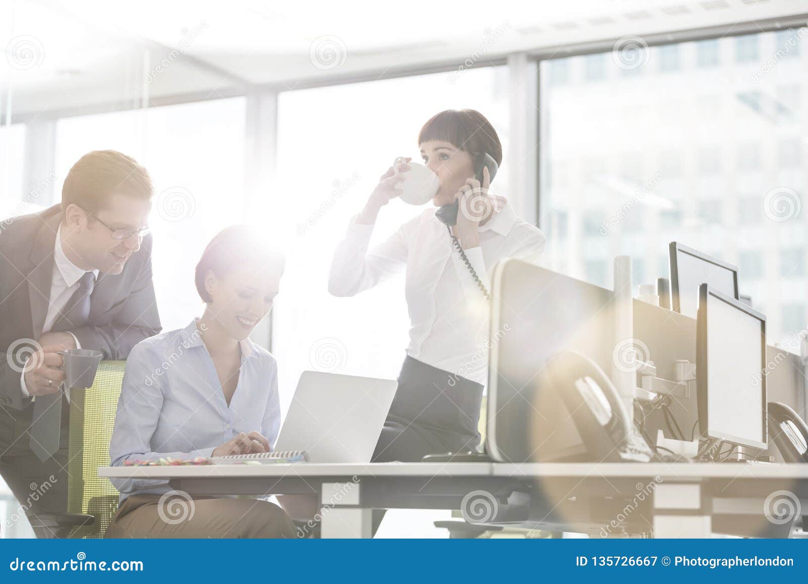 Business Colleagues Working at Desk in Modern Office Stock Image ...