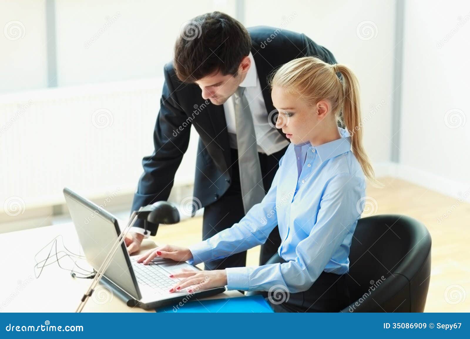 Business Colleagues Working on a Laptop Stock Image - Image of person ...