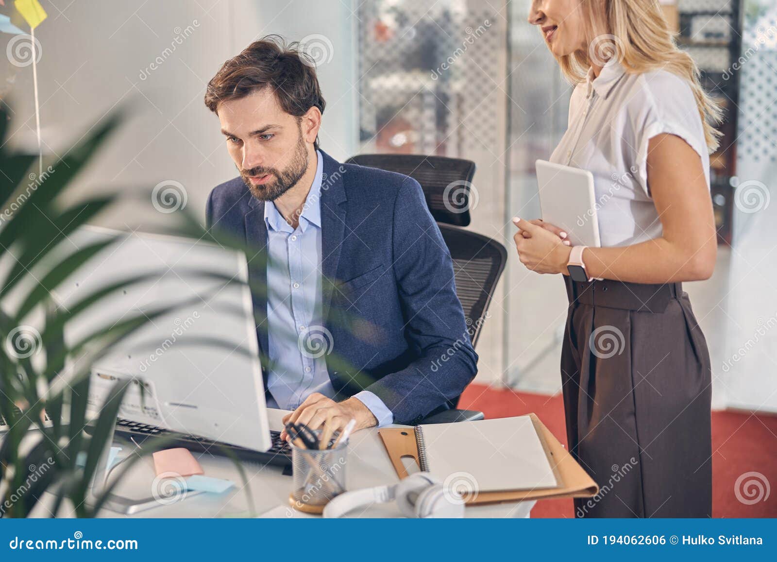 Business Colleagues Working Together in Modern Office Stock Photo ...