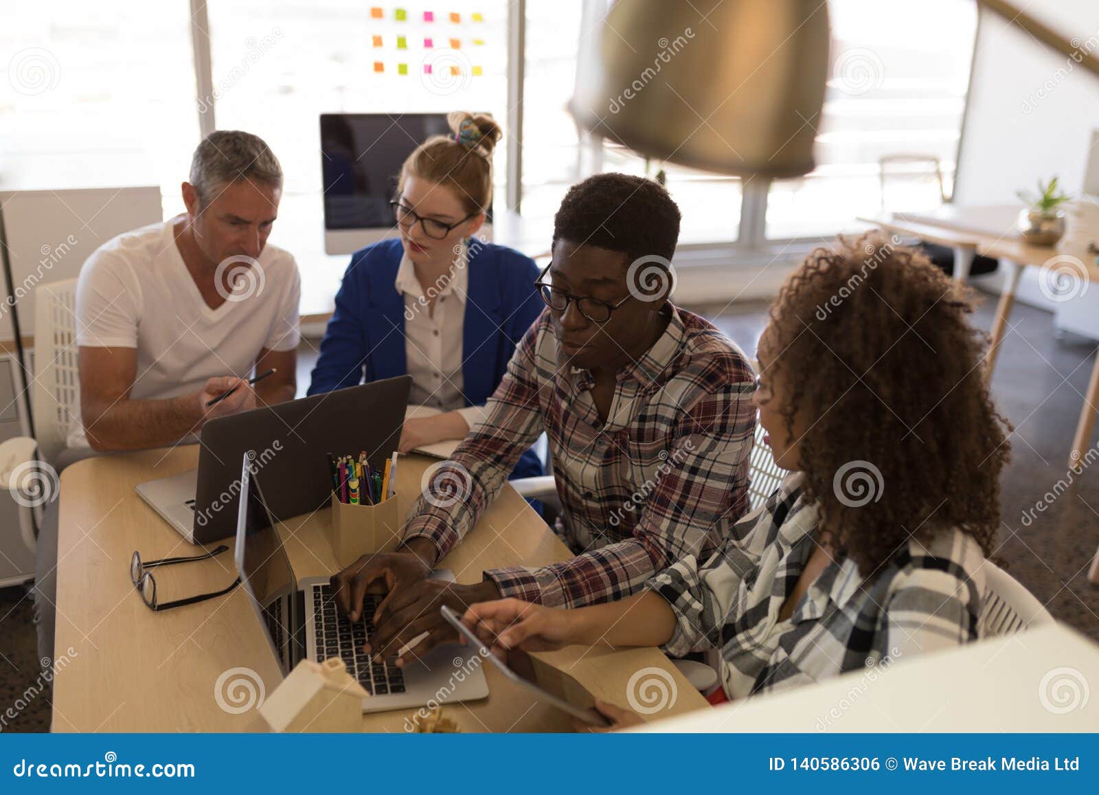 Business Colleagues Working Together in Office Stock Photo - Image of ...