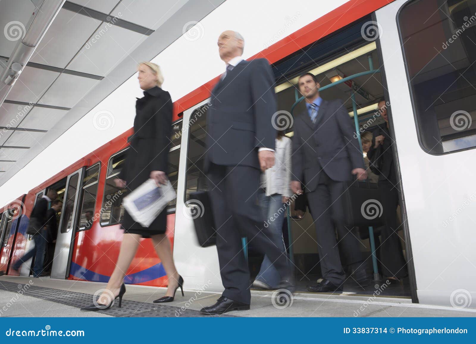 Business Commuters Getting Off Train Stock Photo - Image of angle ...