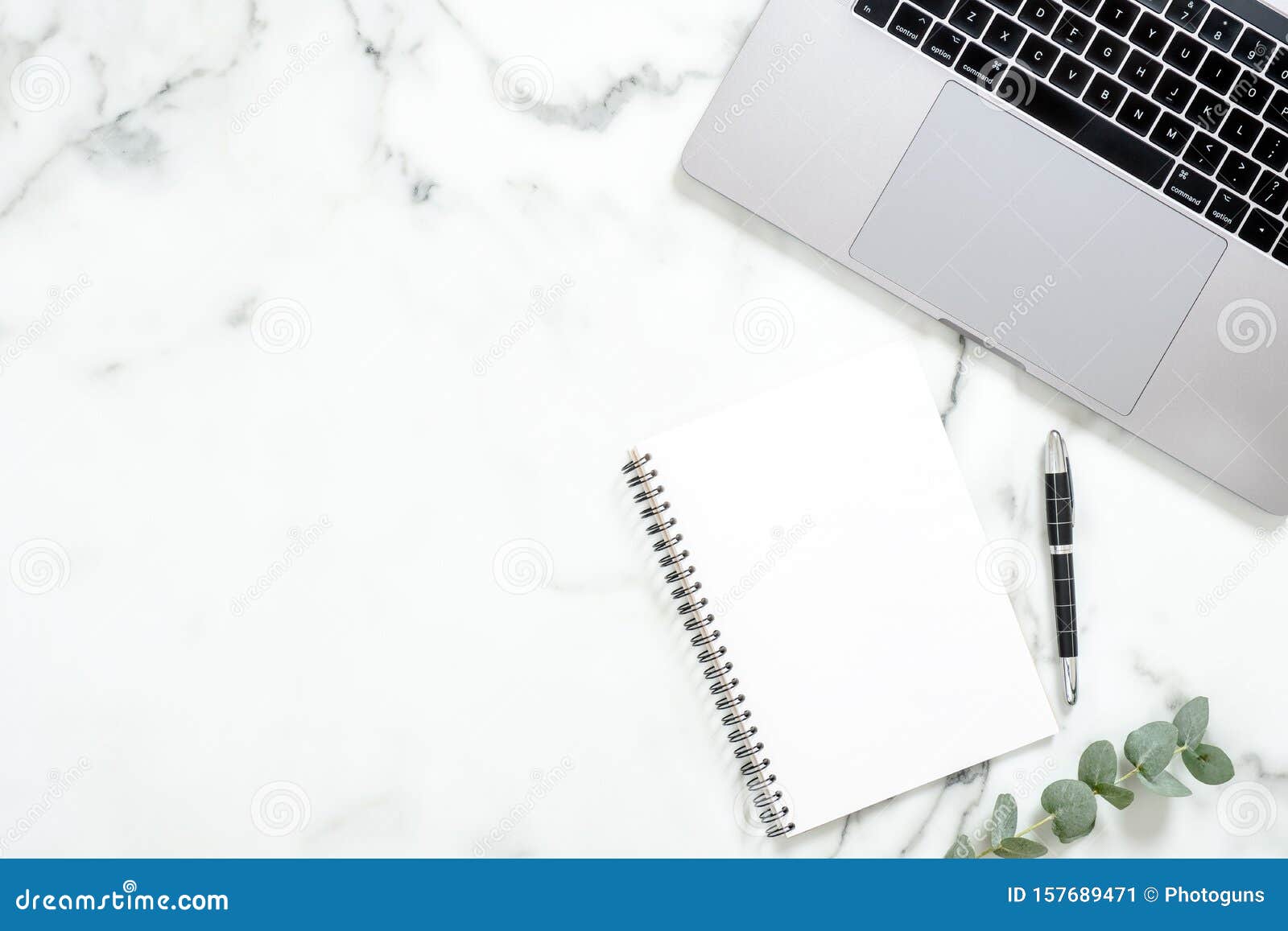 Business Composition with Laptop Computer, Paper Notepad, Pen and ...