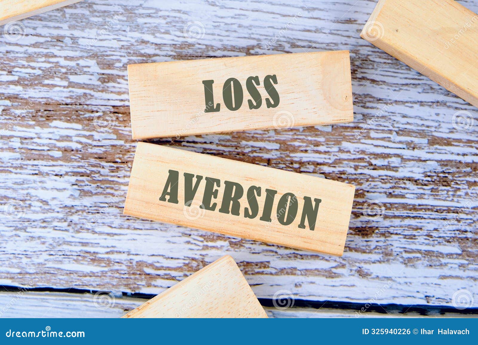 Business Concept. LOSS AVERSION Text on Wooden Blocks on Old Boards ...