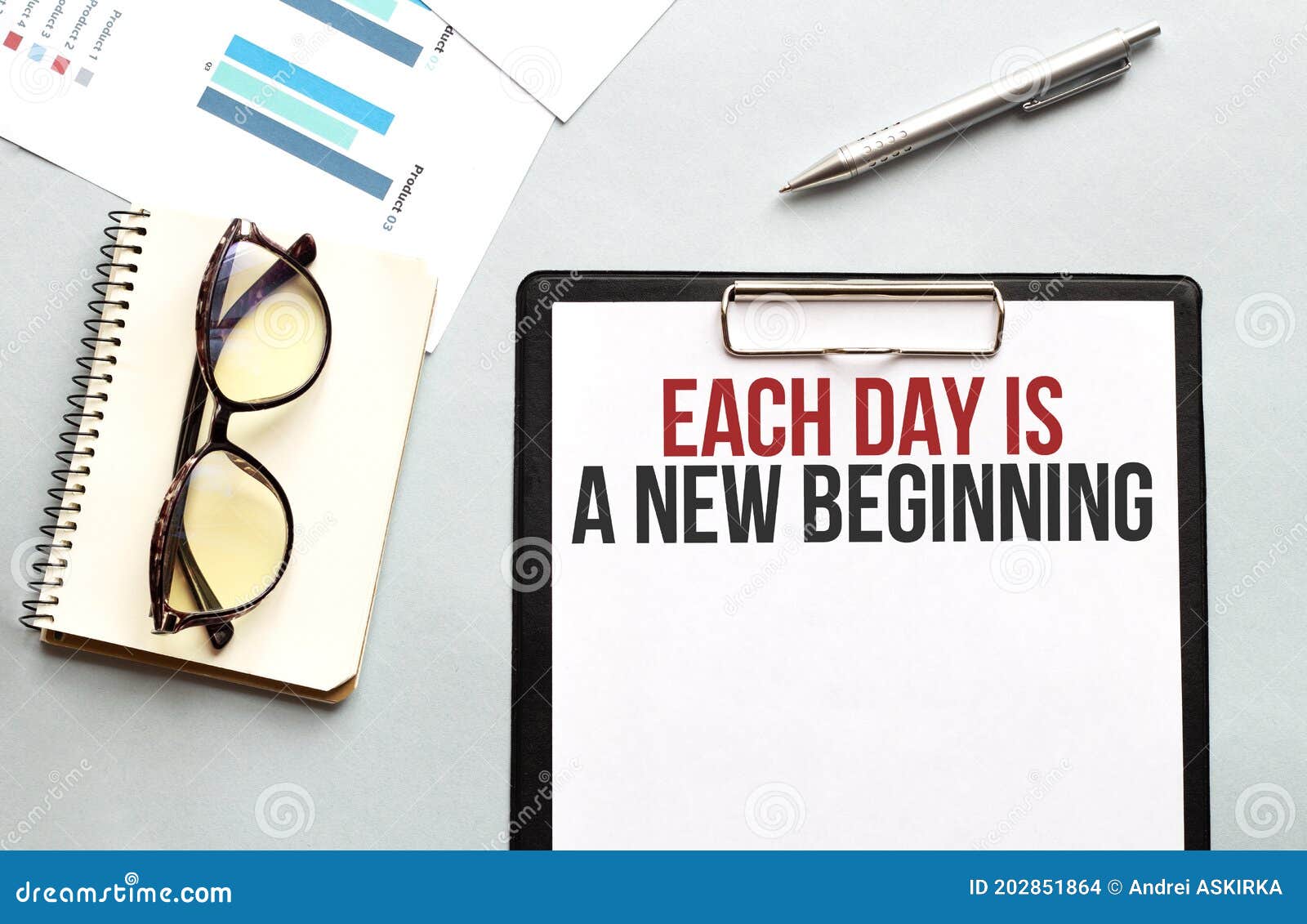 Business Concept. Notebook with Text Each Day is a New Beginning Sheet ...