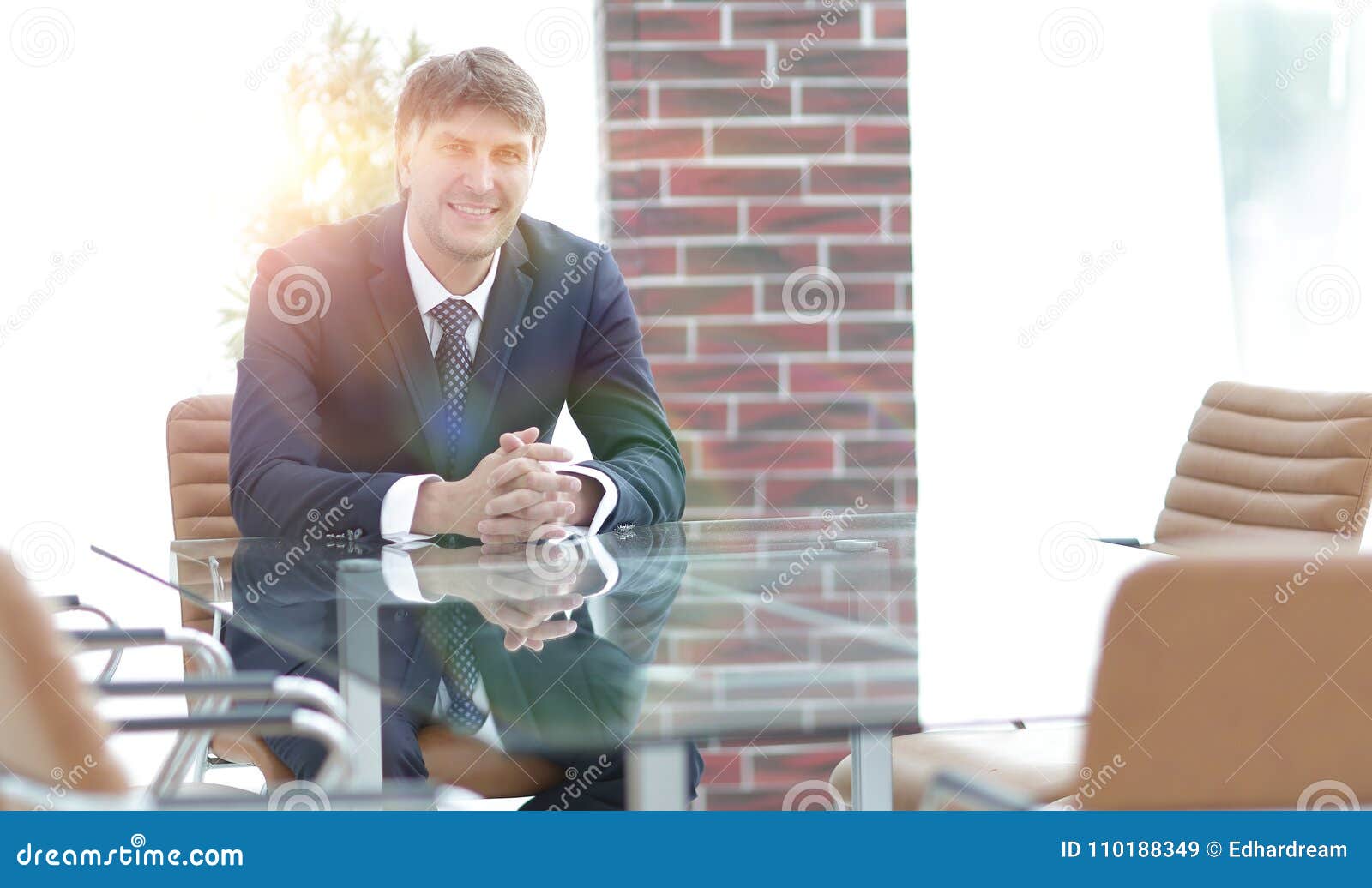 Project Manager Sitting at a Table in an Empty Conference Room Stock ...