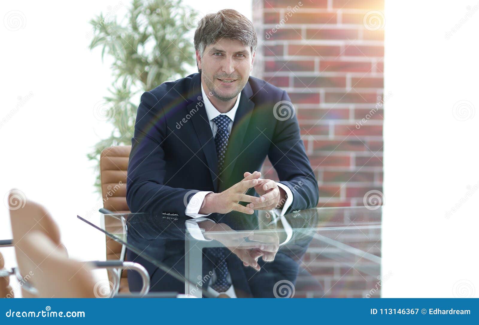 Project Manager Sitting at a Table in an Empty Conference Room Stock ...