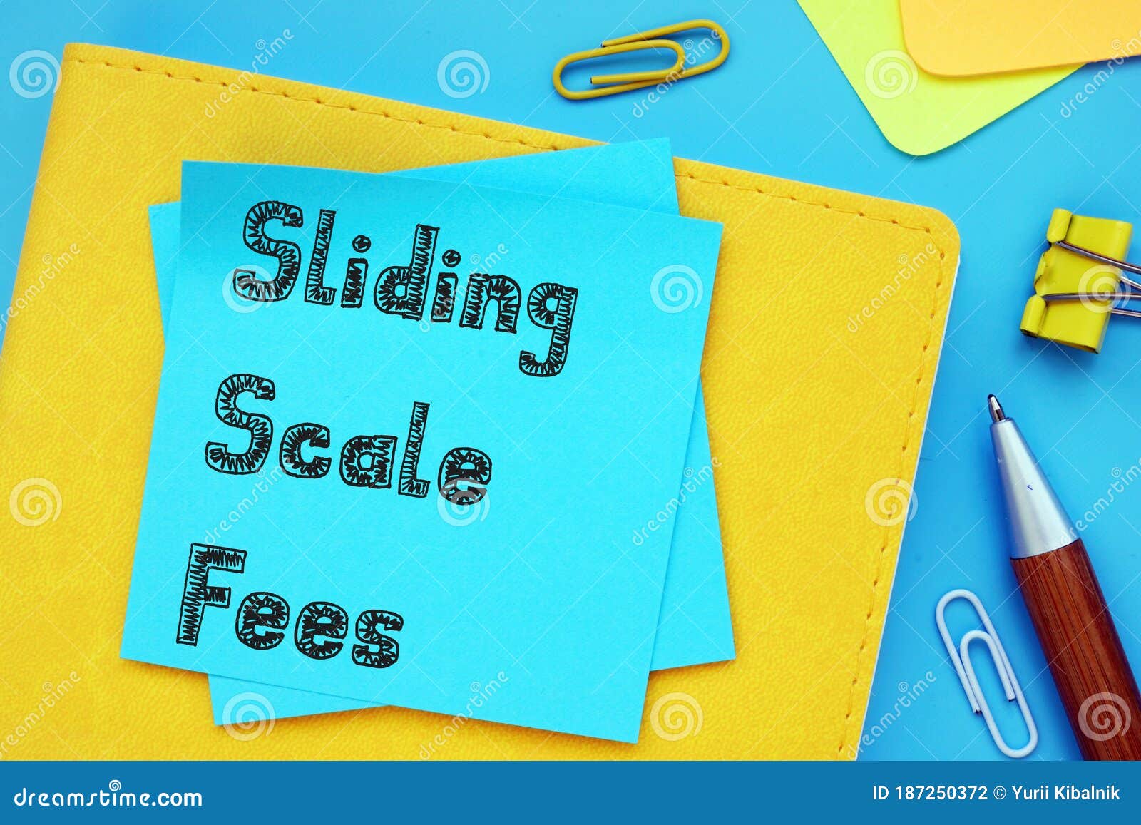 Business Concept about Sliding Scale Fees with Sign on the Sheet Stock ...