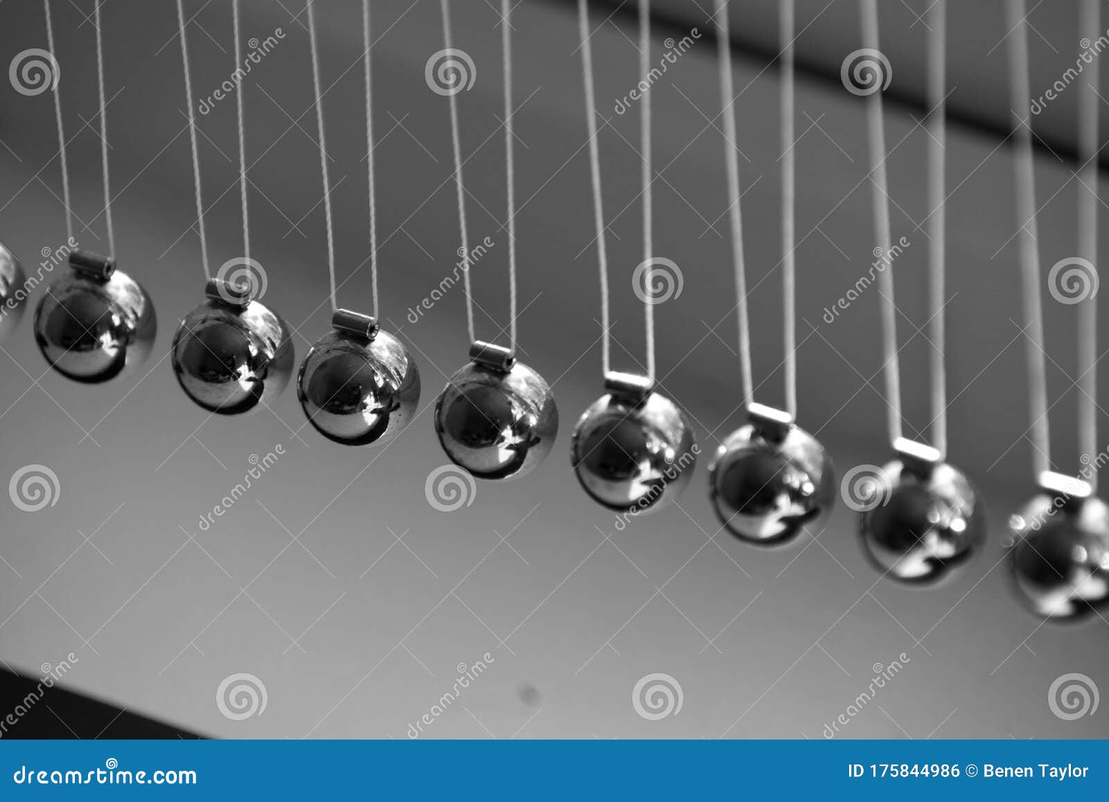 Business Concept for Strategy Team Work and Alignment. Newtons Cradle ...