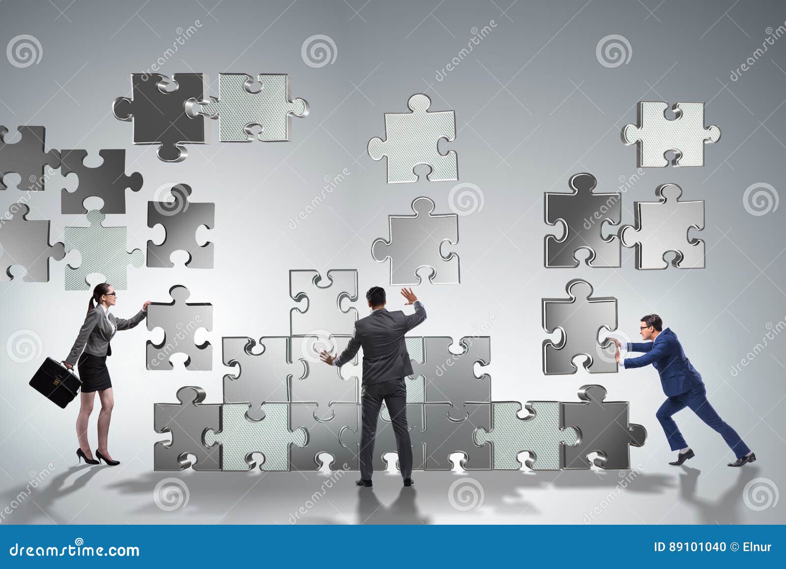 The Business Concept of Teamwork with Puzzle Pieces Stock Photo - Image ...
