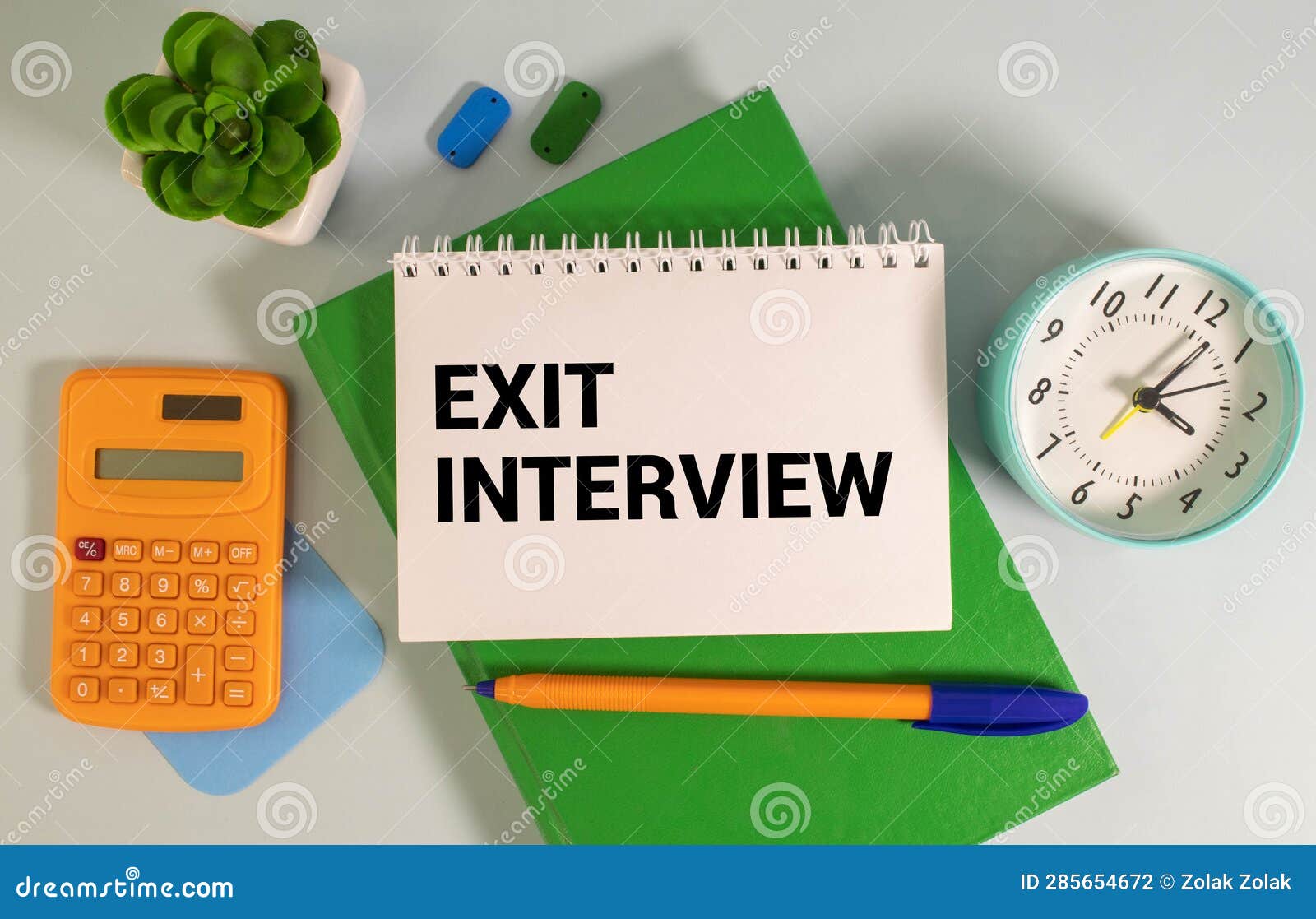 Business Concept.Text EXIT INTERVIEW Writing on Notepaper with Pen and ...