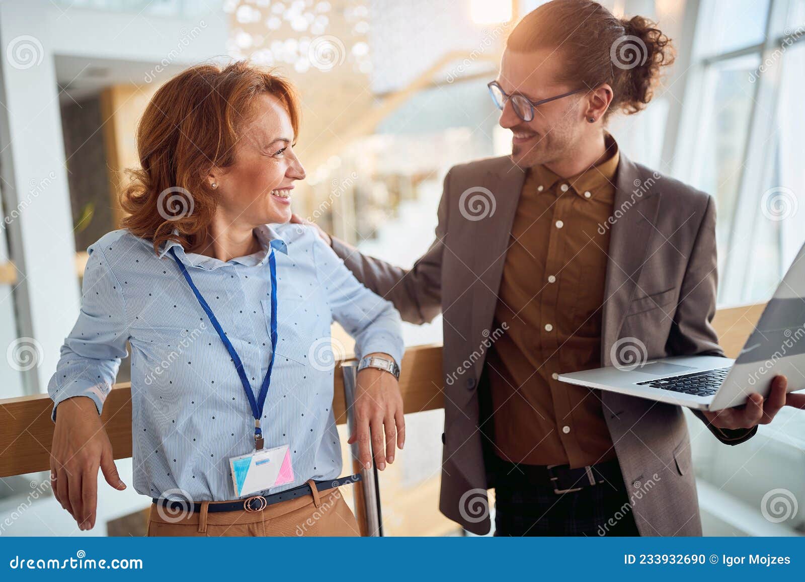 Business Consultation. Smiling People Working Together on Computer ...