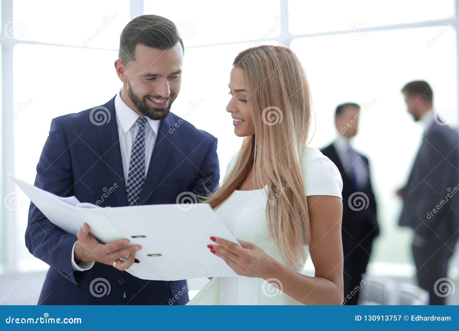 Business Couple Discussing Business Document Stock Image - Image of ...