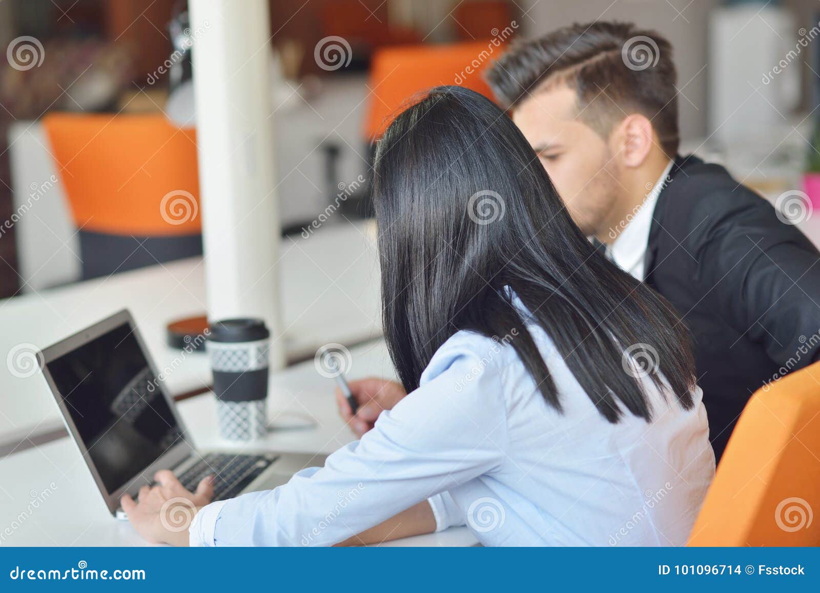 Business Couple in an Office Working on the Computer Stock Photo ...