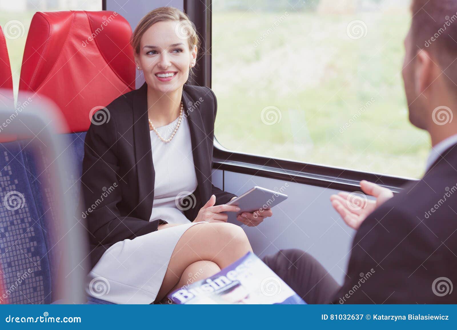 Business Couple Talking in Train Stock Image - Image of business ...