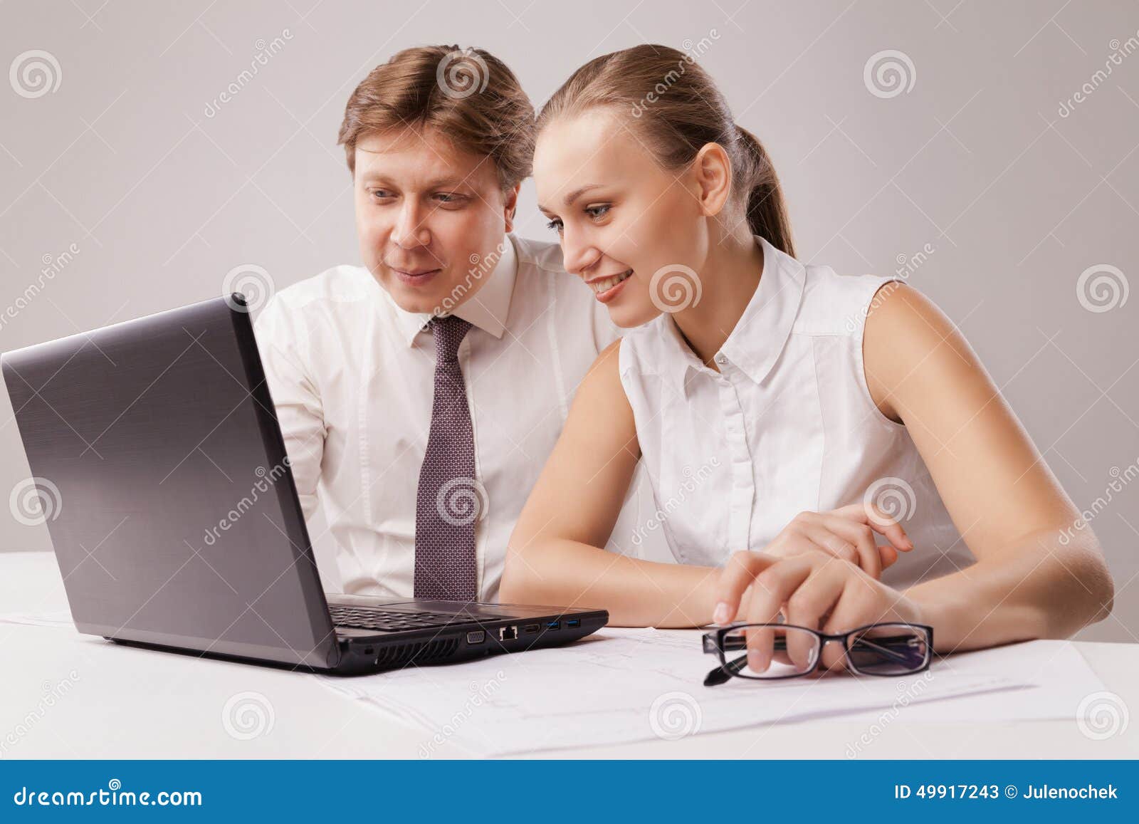 Business Couple Using Laptop Stock Image - Image of computer, couple ...