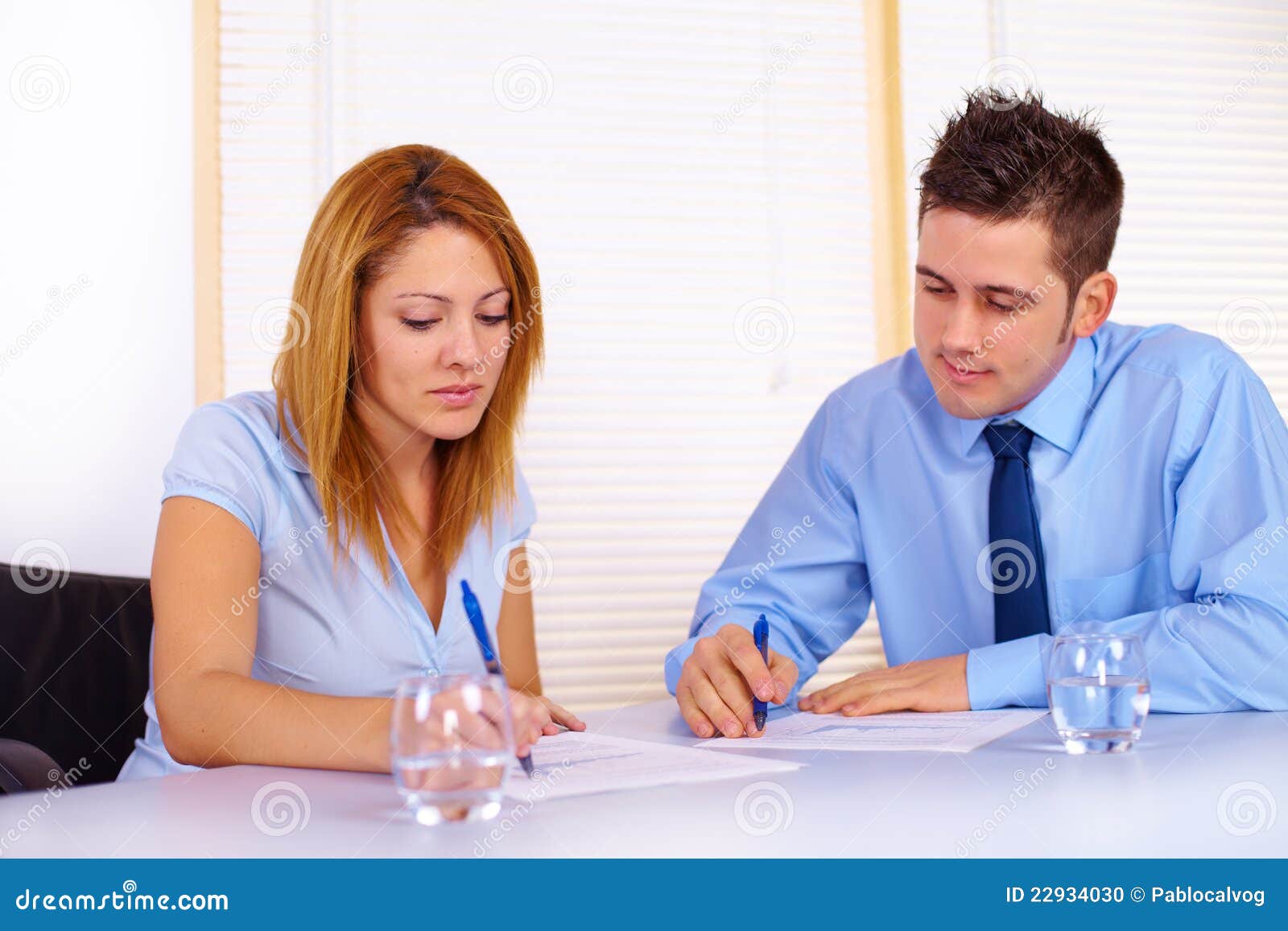 Business couple working stock photo. Image of brown, adult - 22934030