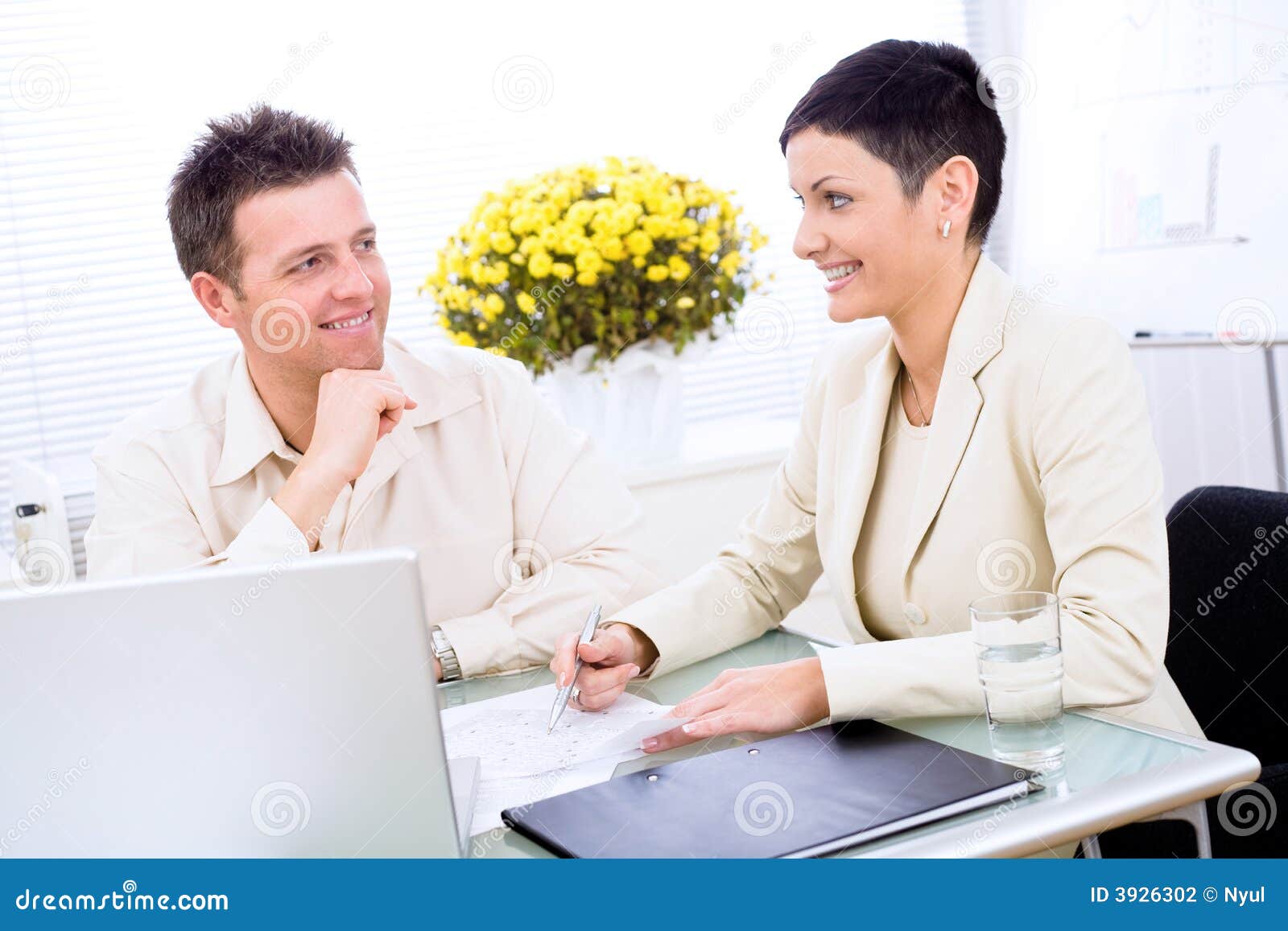 Business couple working stock photo. Image of flower, desk - 3926302