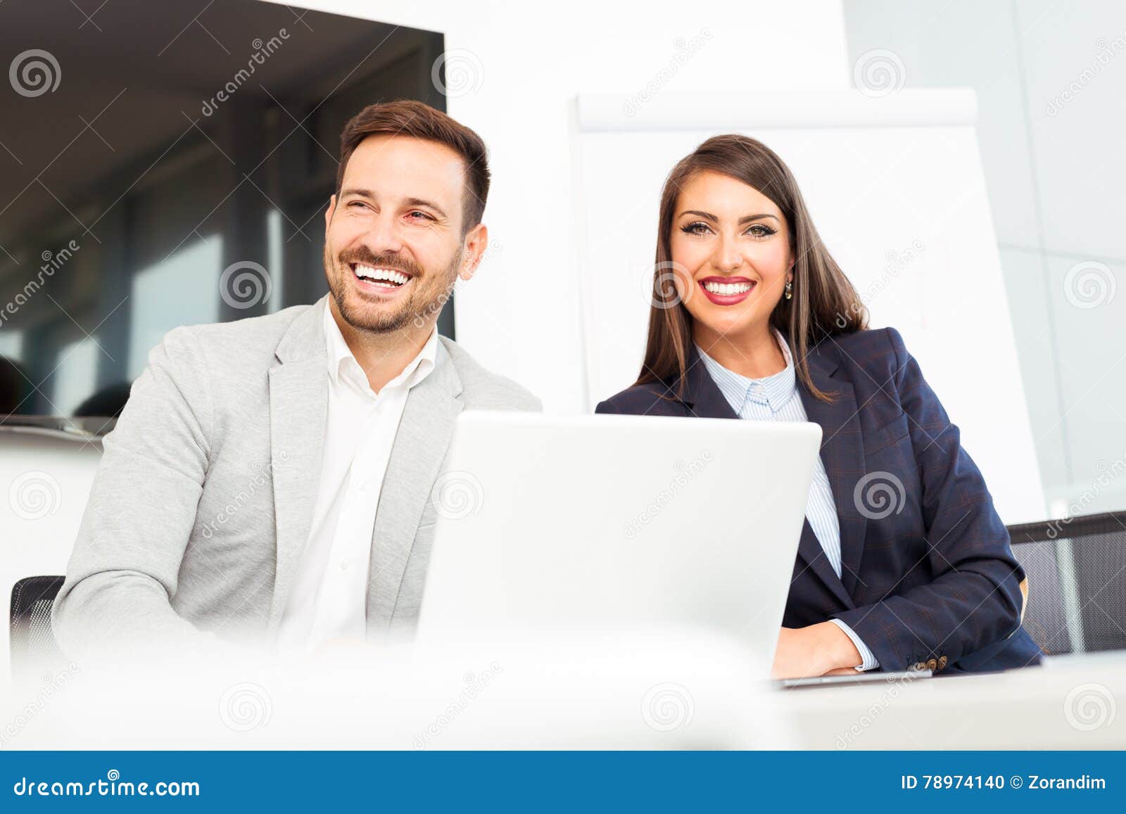 Business Couple Working Together on Project at Modern Office Stock ...