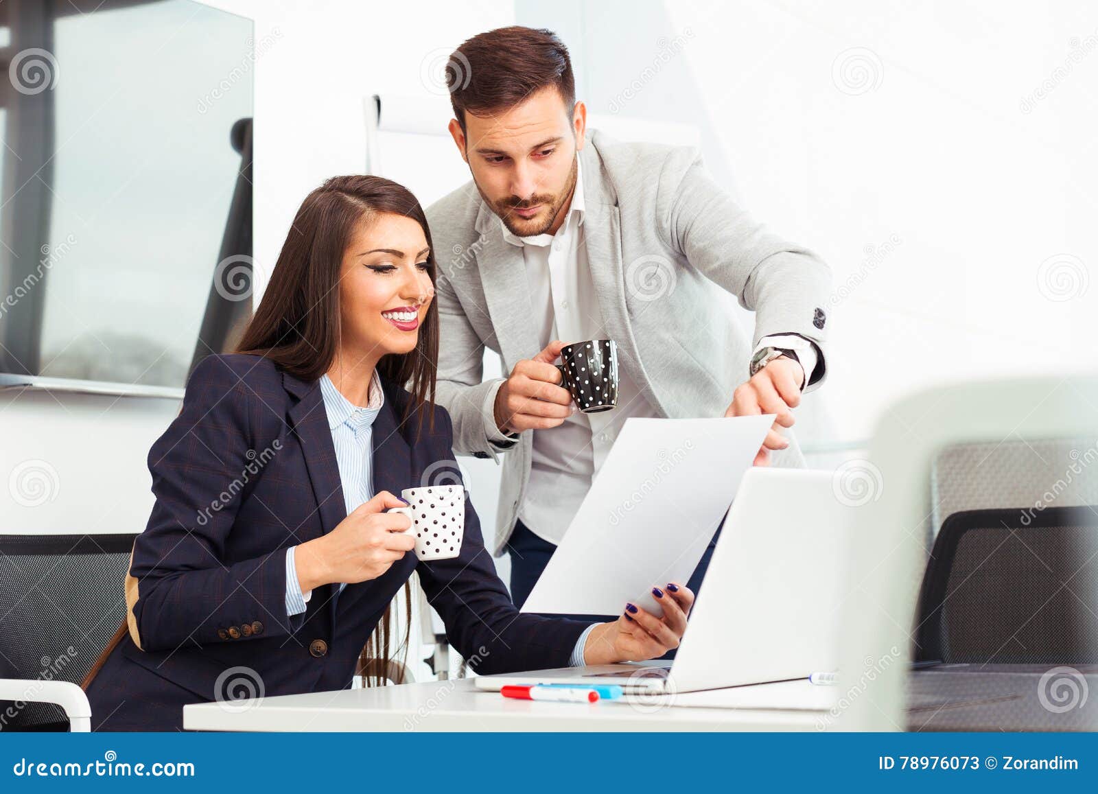 Business Couple Working Together on Project at Modern Office Stock ...