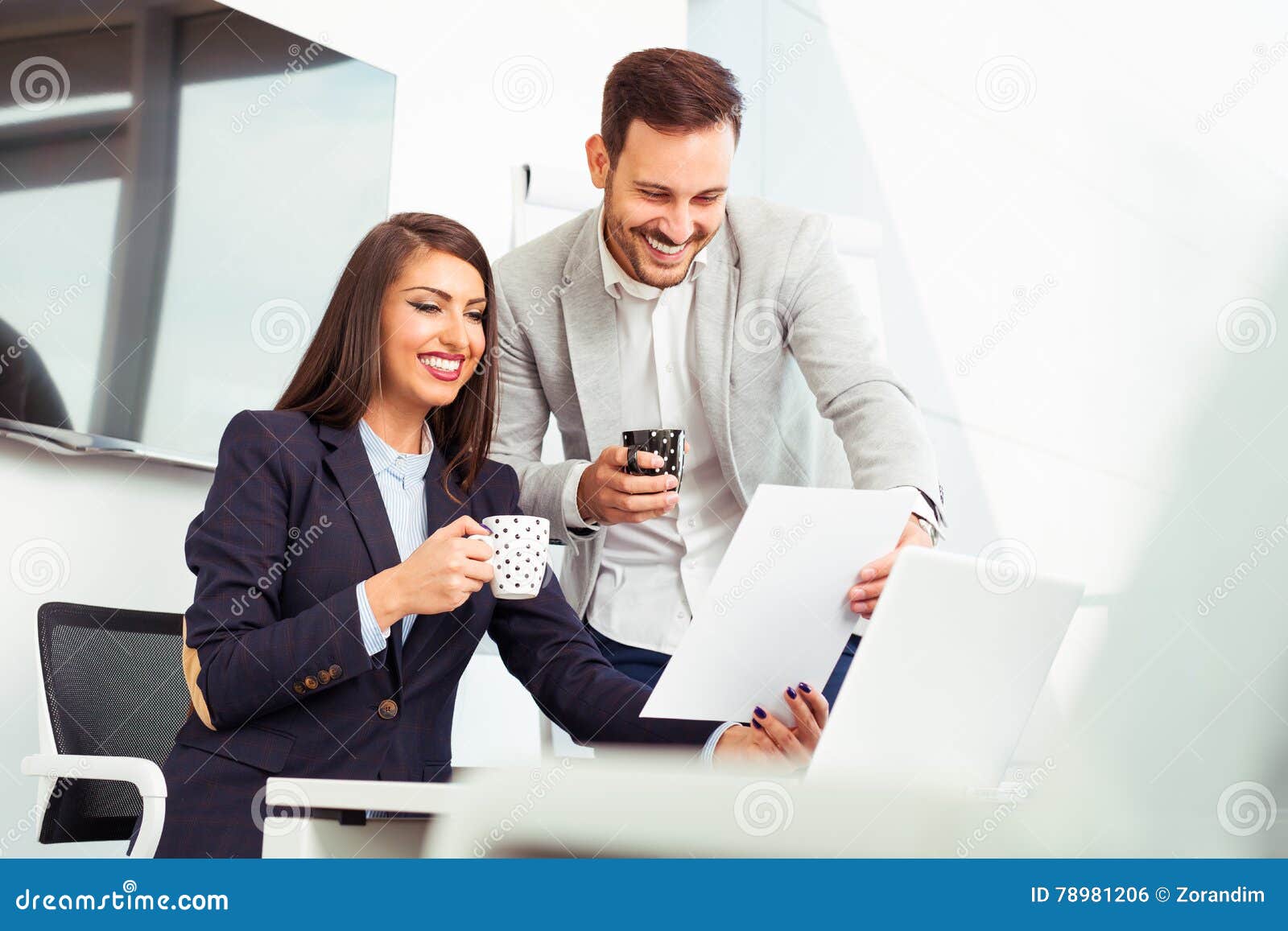 Business Couple Working Together on Project at Modern Office Stock ...