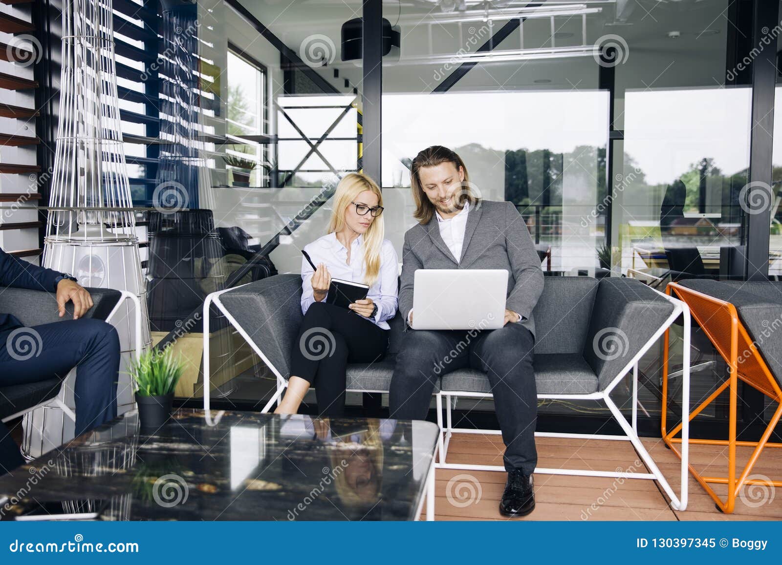 Business Couple Working Together on Project at Modern Startup of Stock ...