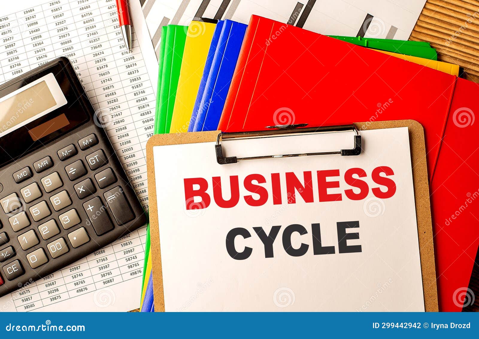 BUSINESS CYCLE Text Written on Paper Clipboard with Chart and ...