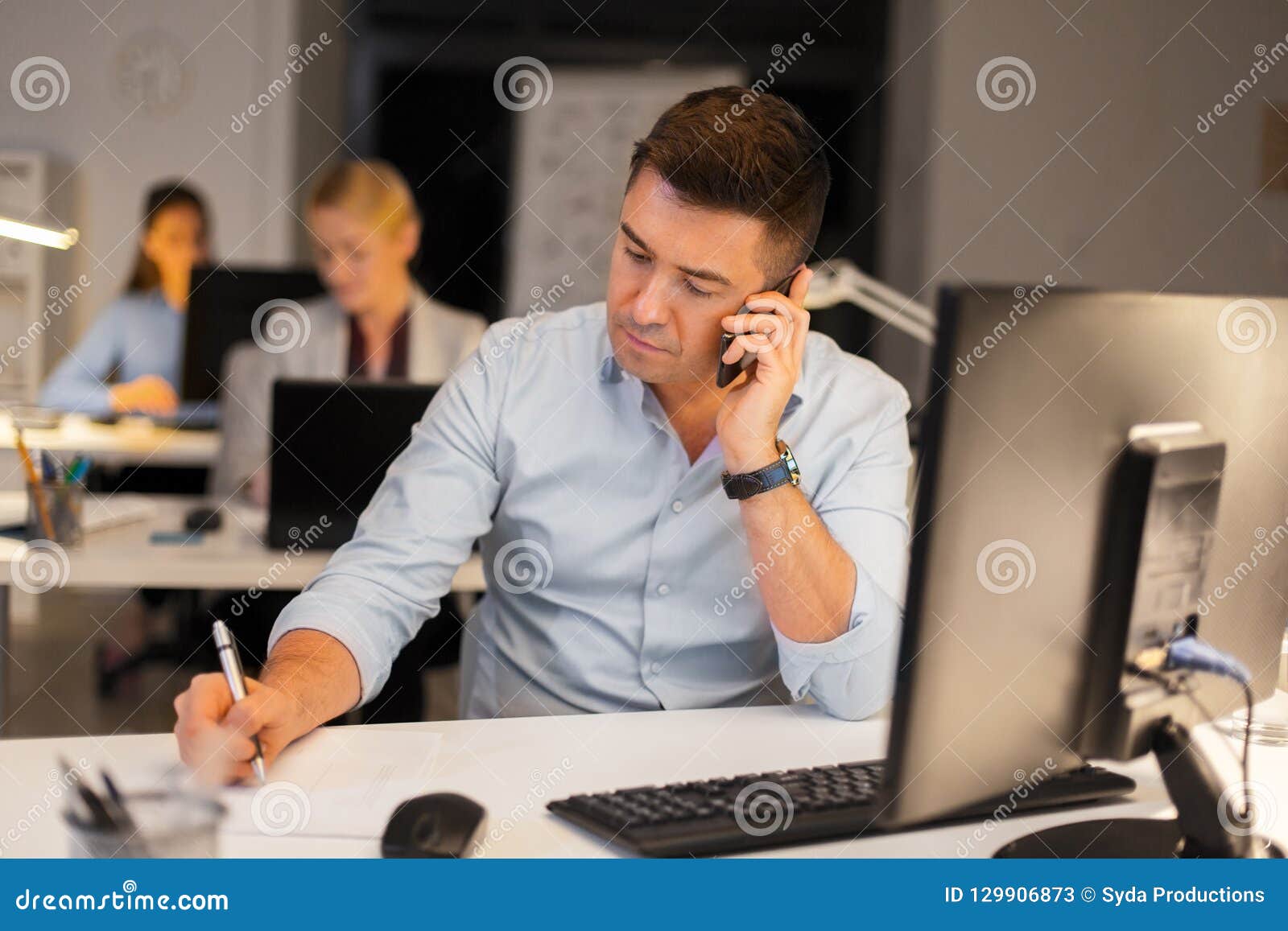 Man Calling on Smartphone at Night Office Stock Image - Image of ...