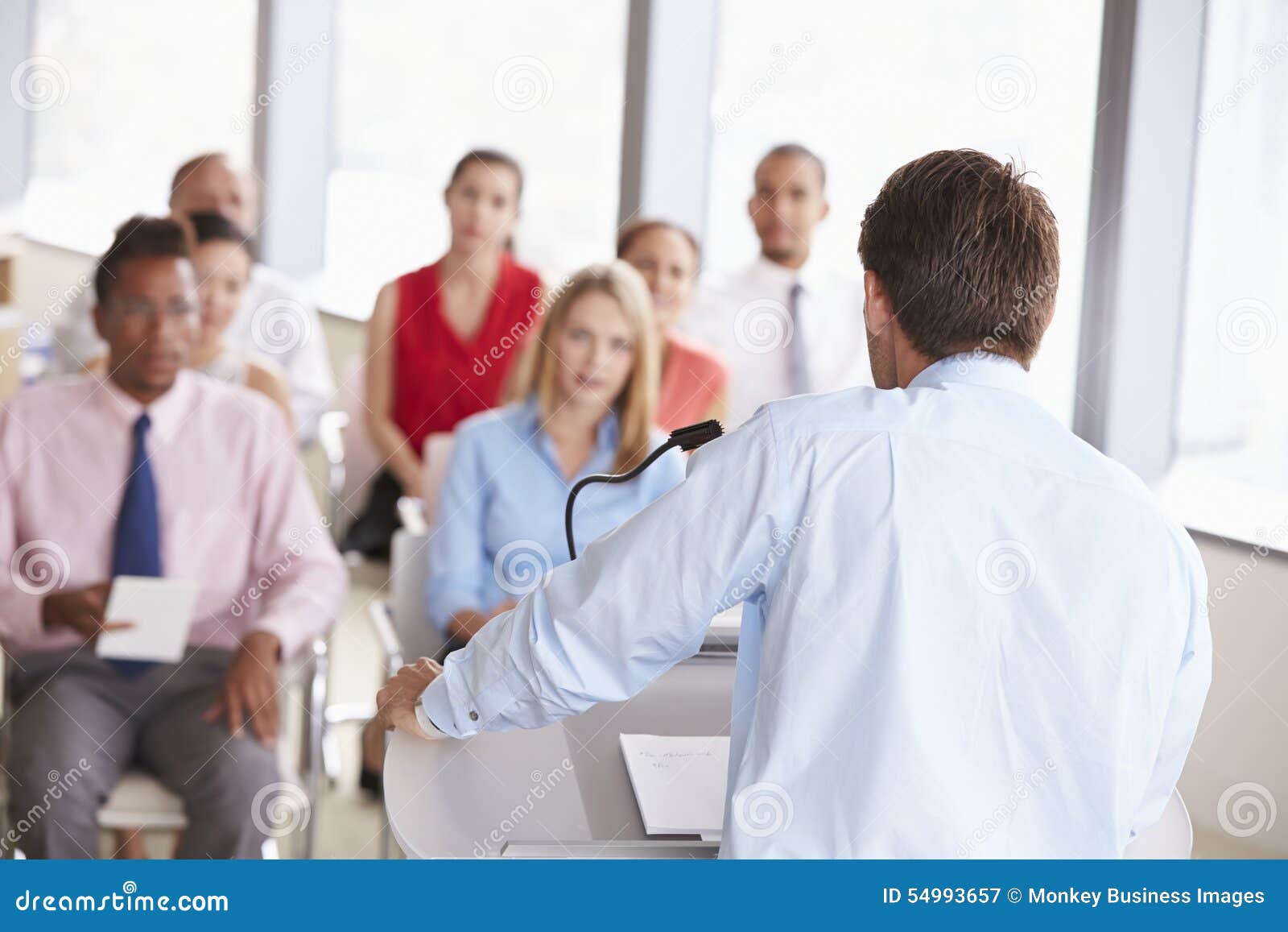 Business Delegates Listening To Presentation at Conference Stock Image ...