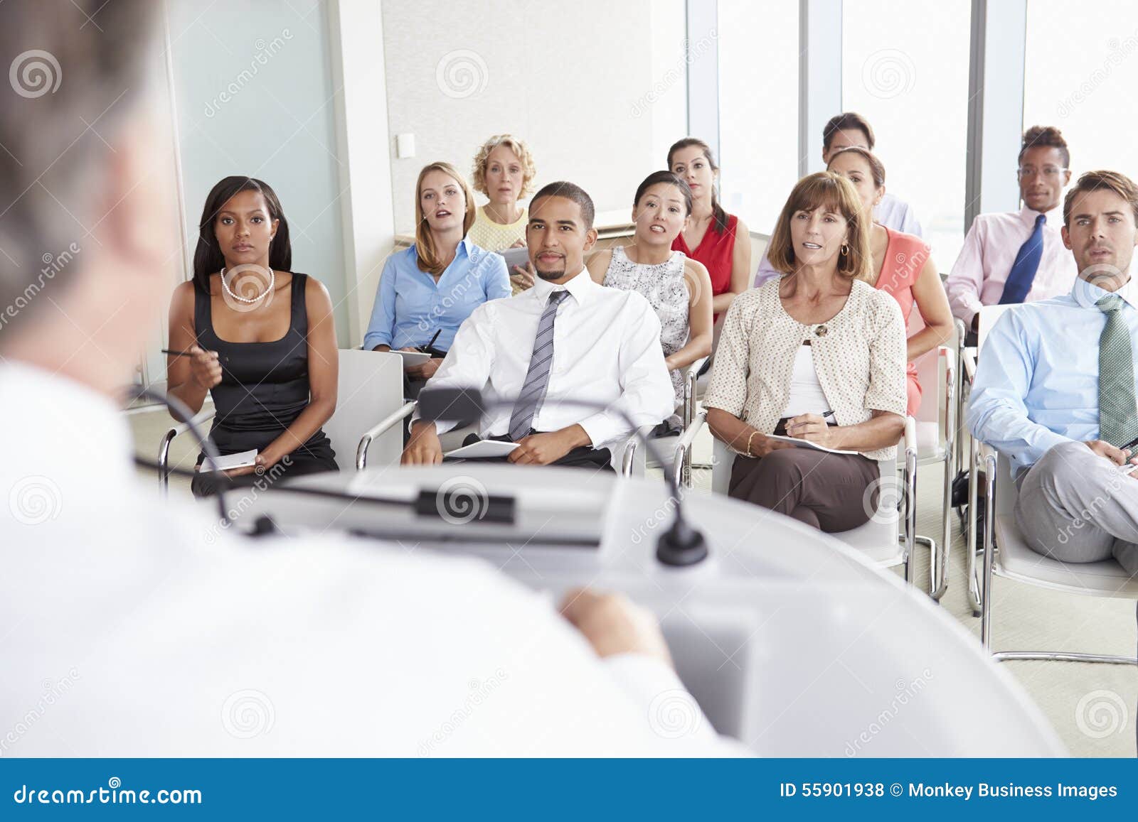 Business Delegates Listening To Presentation at Conference Stock Photo ...