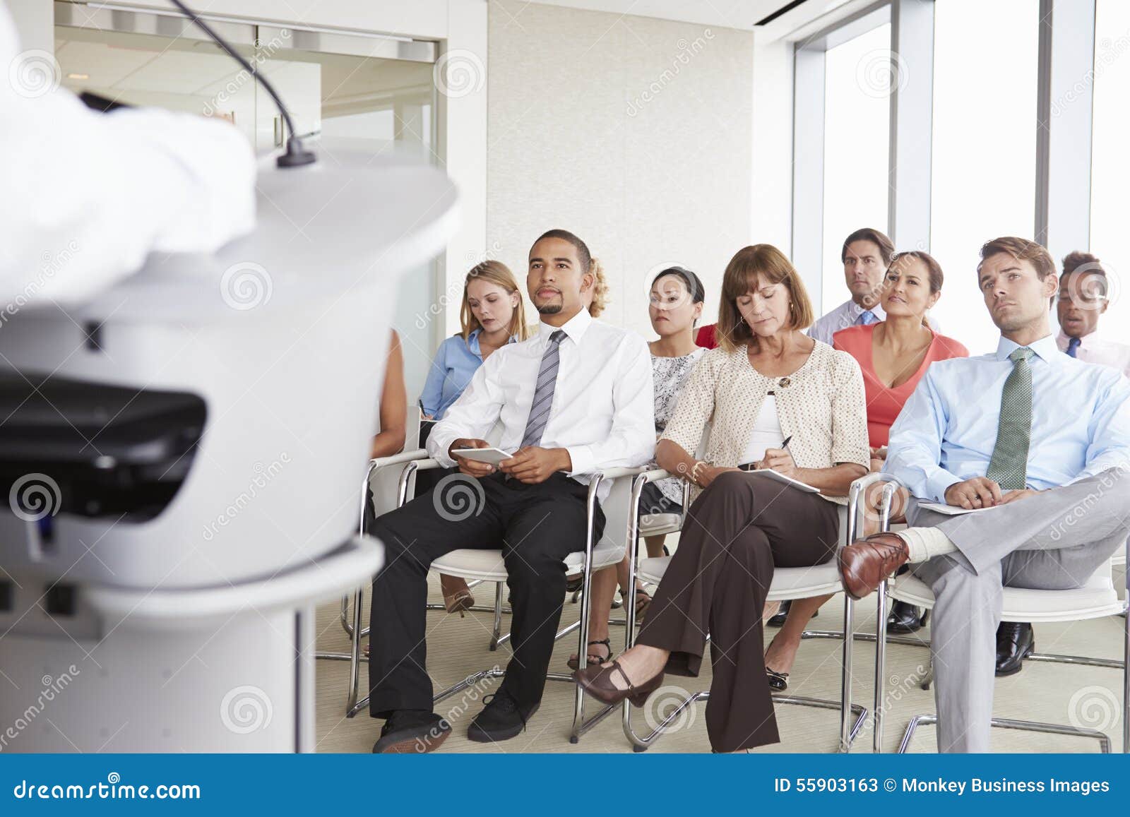 Business Delegates Listening To Presentation at Conference Stock Image ...
