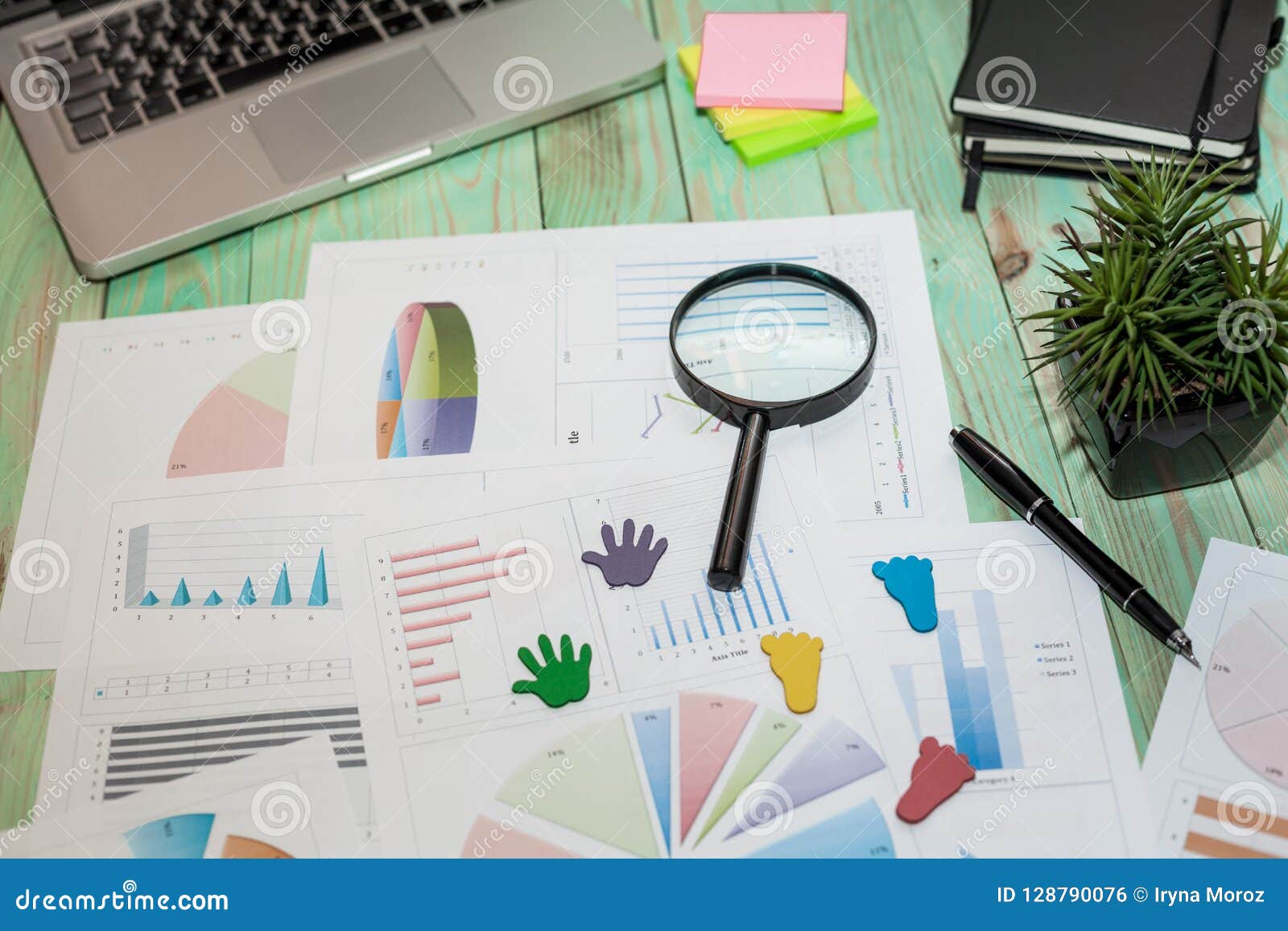 Looking At Growth Chart With Magnifying Glass. Graphs, Charts An ...