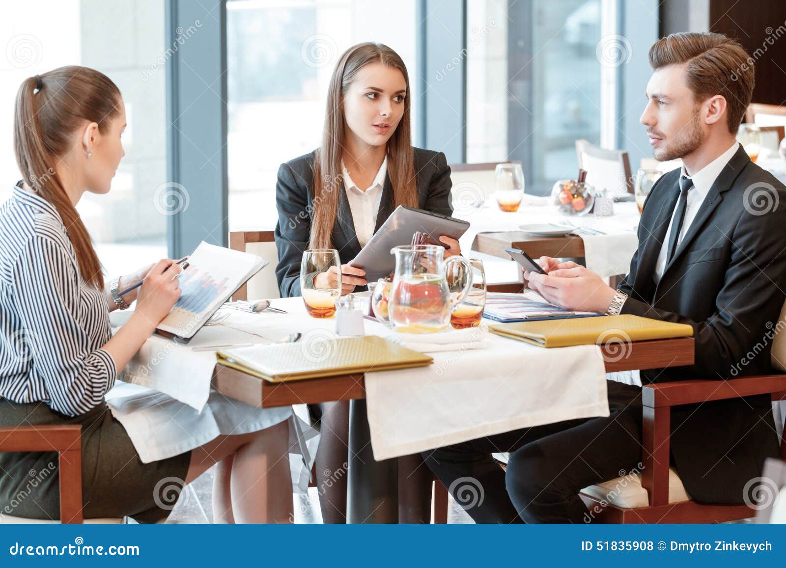 Business Discussion at the Lunch between Stock Photo - Image of ...